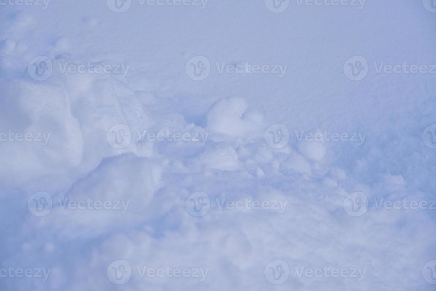 Snow surface with lumps and snowdrifts in winter. Winter snow field ...