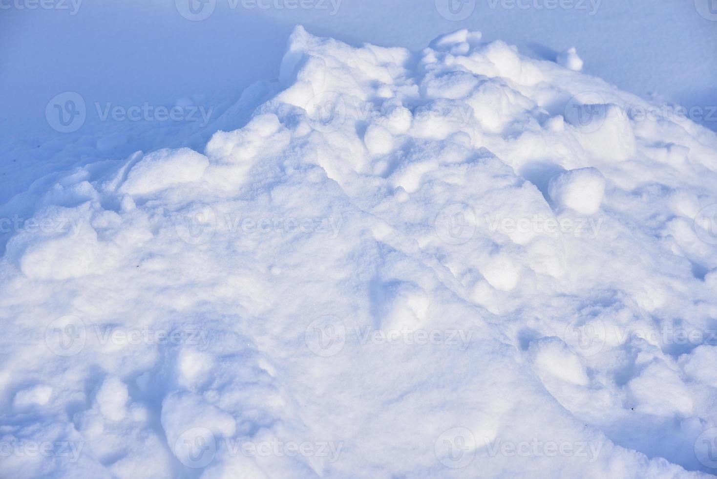 Snow surface with lumps and snowdrifts in winter. Winter snow field ...
