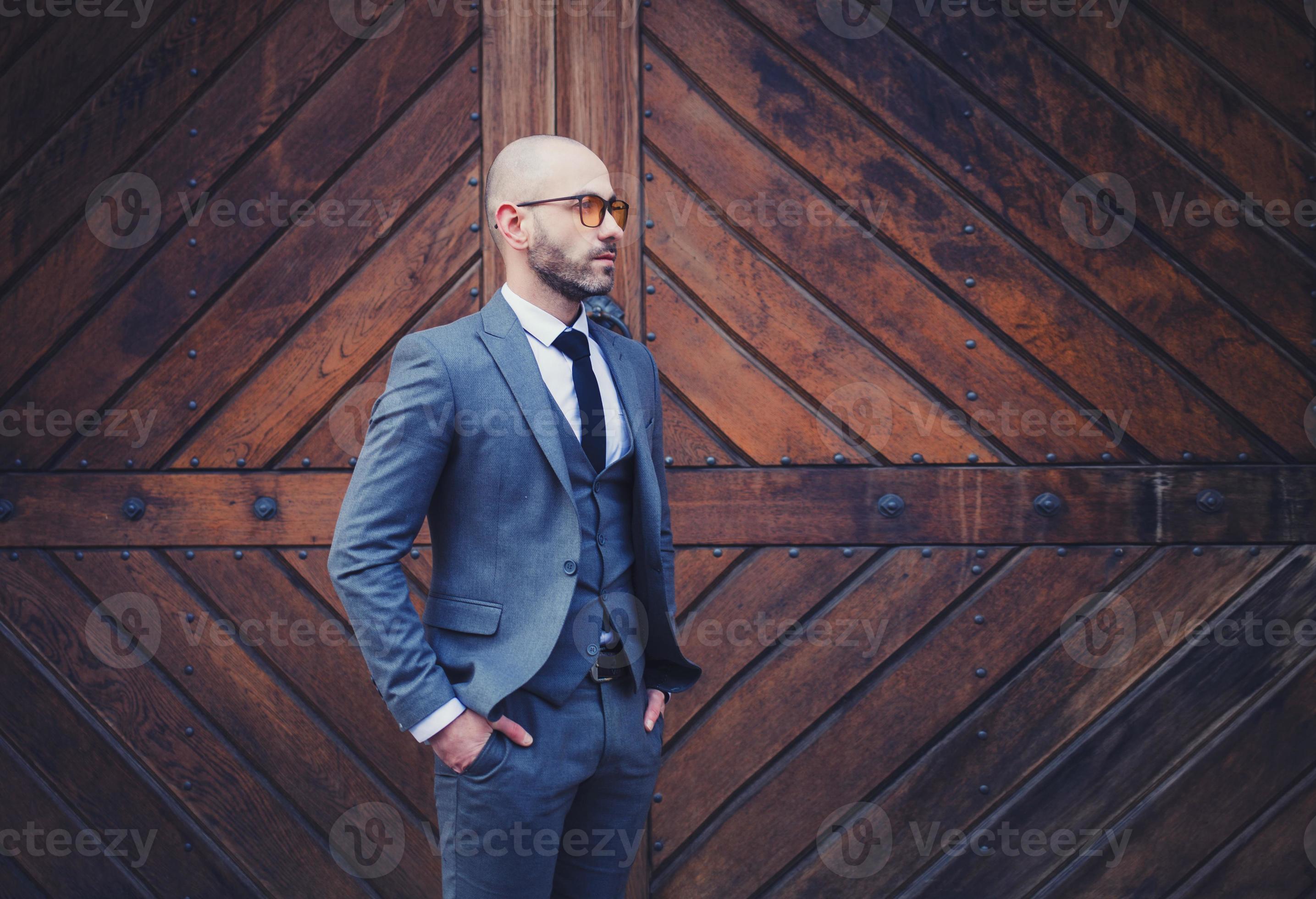 Elegant handsome man in classical suit 15601973 Stock Photo at Vecteezy