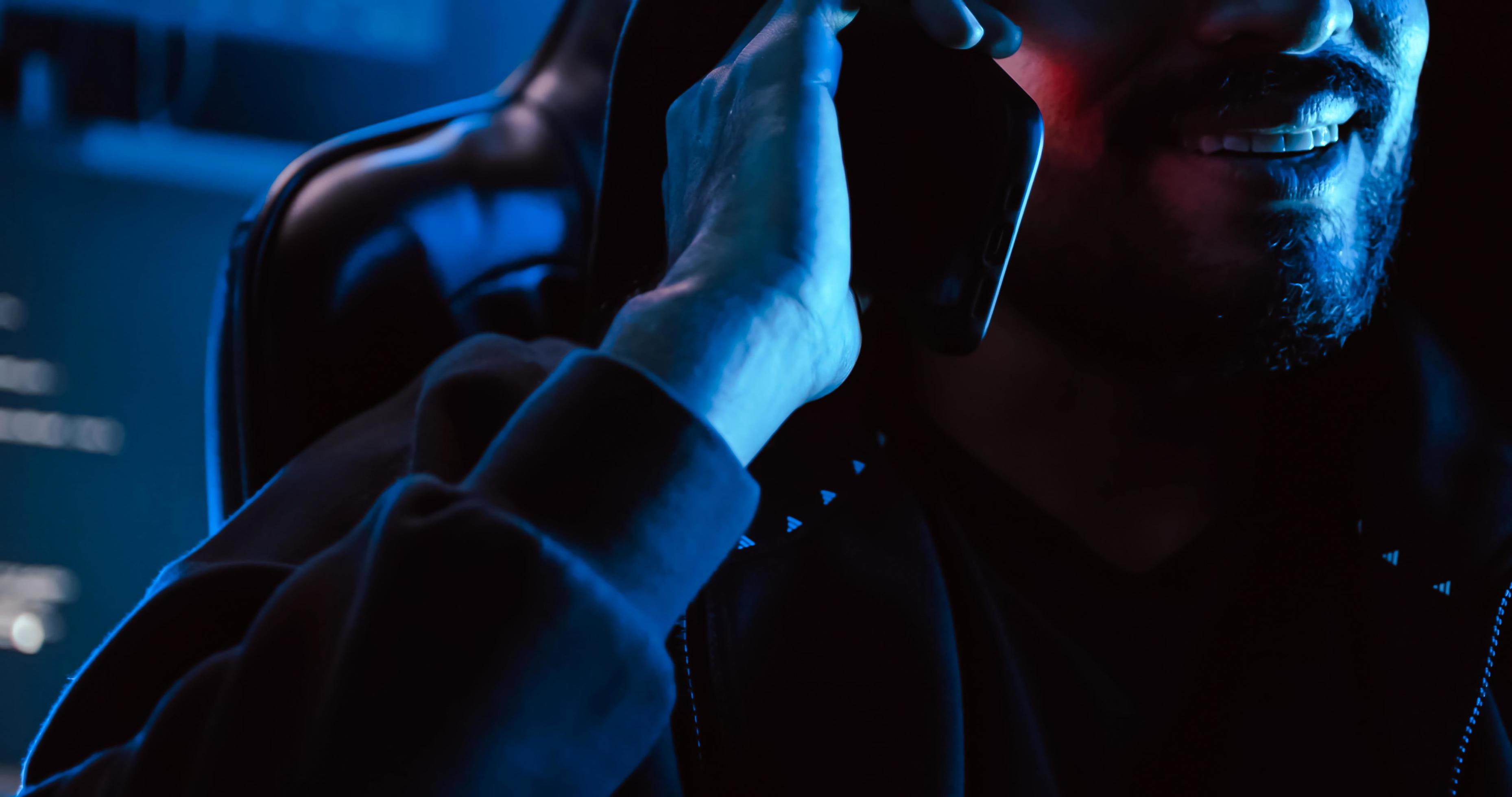 A Male Hacker Is Using A Computer To Hack Data To Demand Ransom From Victims 15603330 Stock