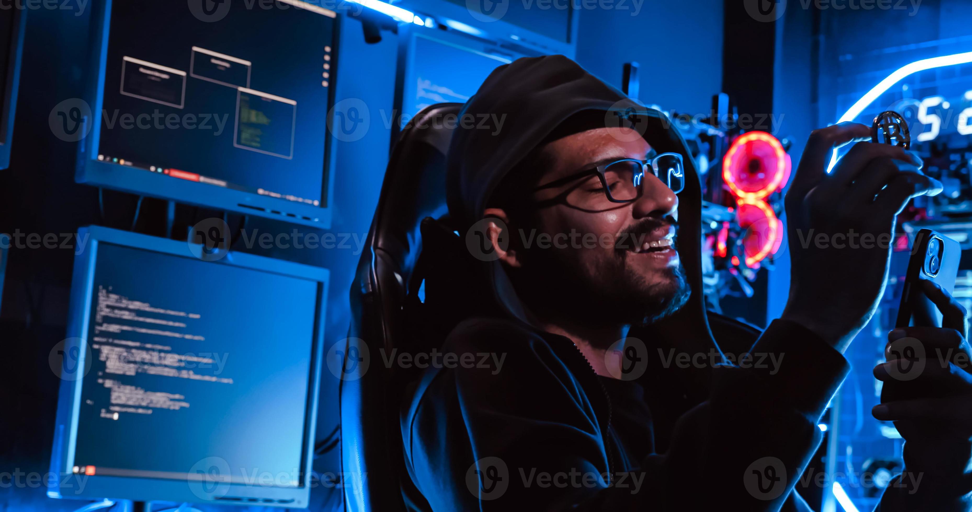 A male hacker is using a computer to hack data to demand ransom from victims. 15603366 Stock ...