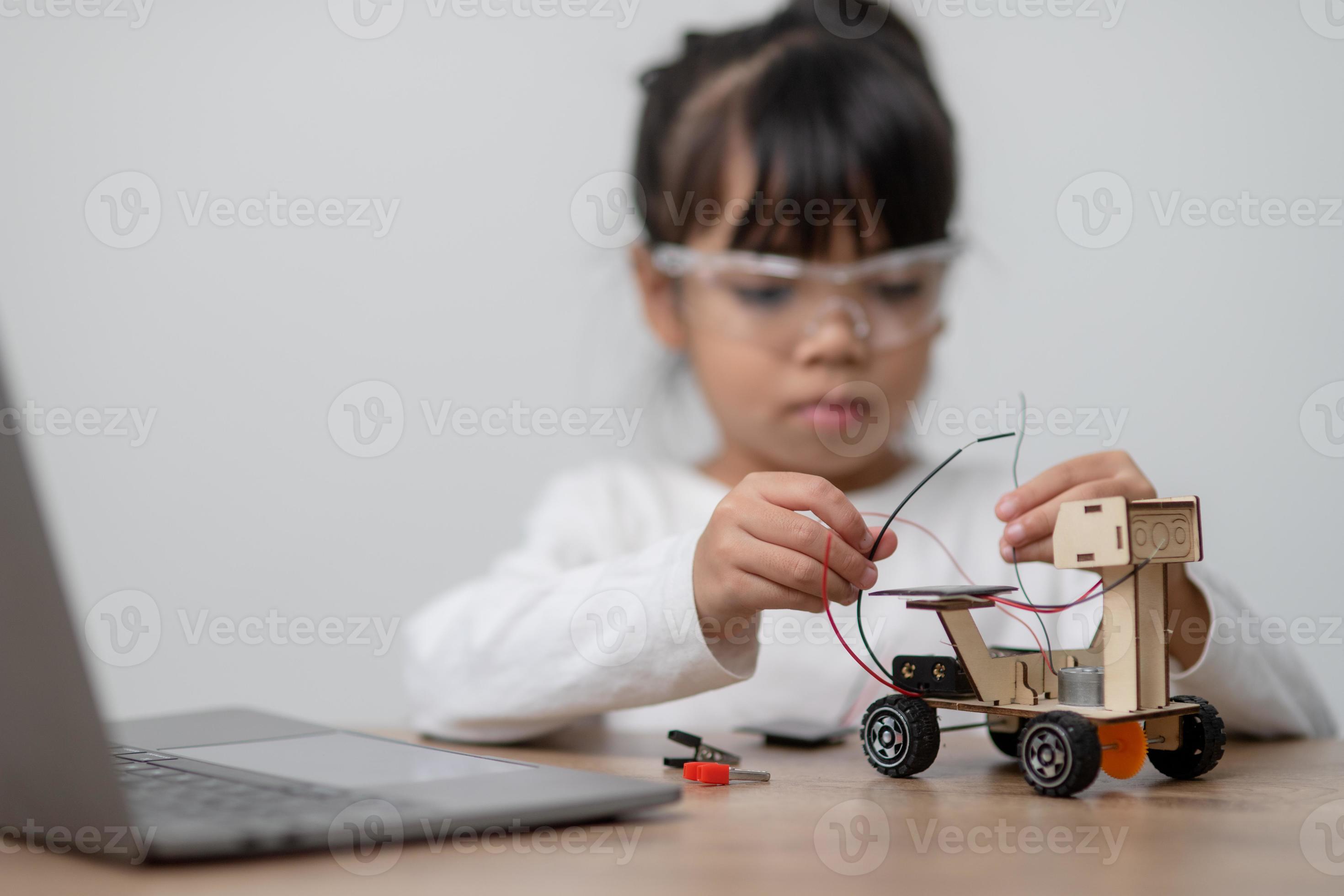 Asia students learn at home in coding robot cars and electronic board ...