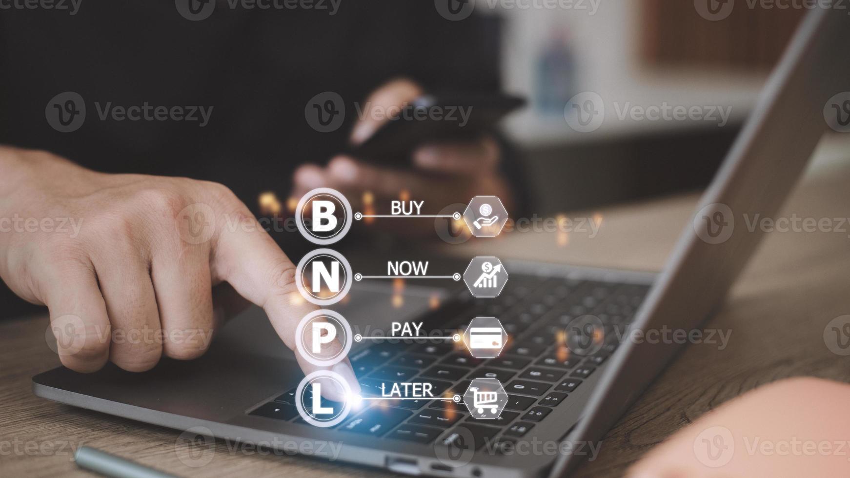 Businessmen holding a smartphone with icons of BNPL with online shopping icons technology. BNPL ...