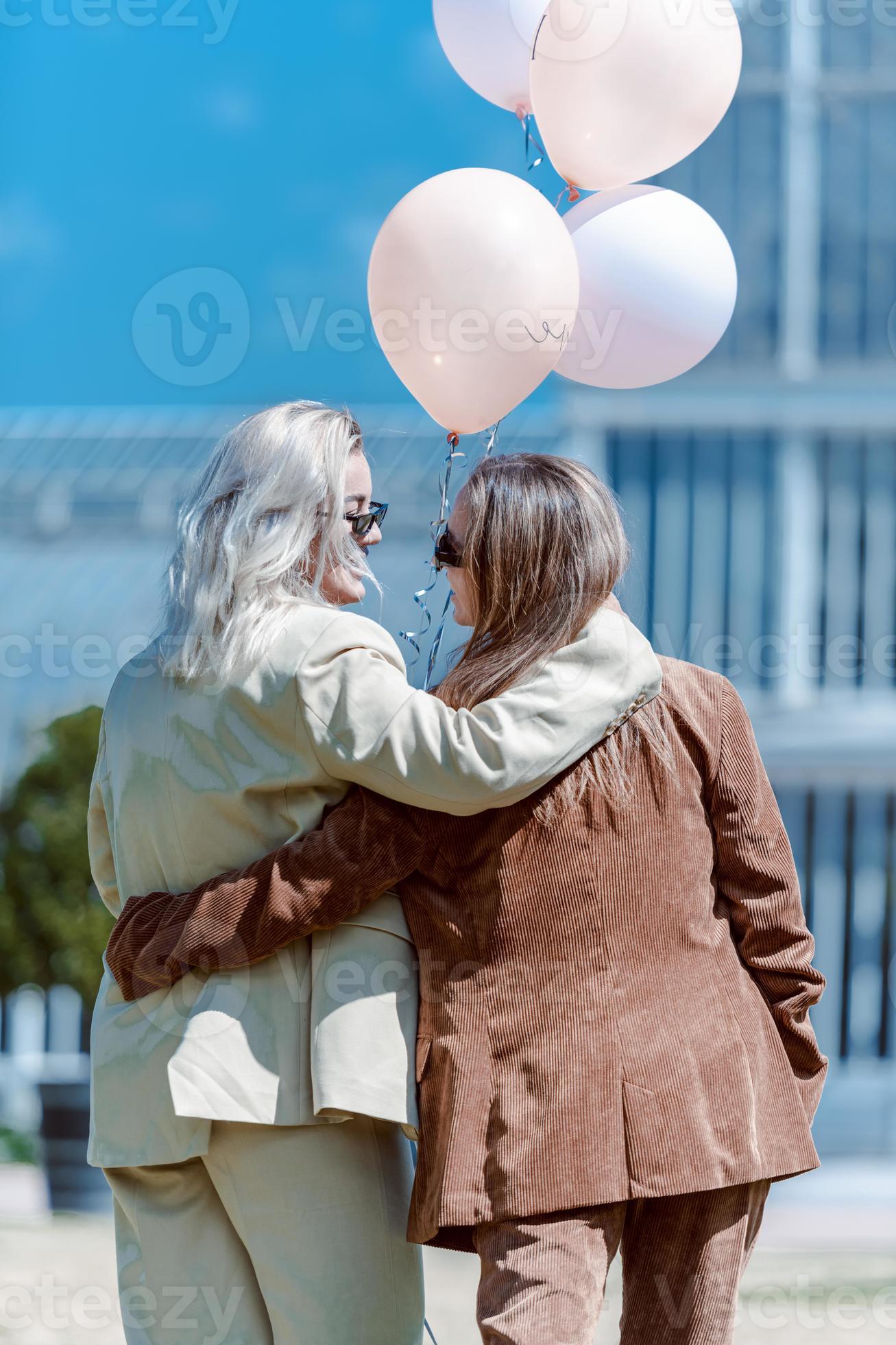 Lgbt Lesbian Couple Love Moments Lesbian Couple Holding Balloons In