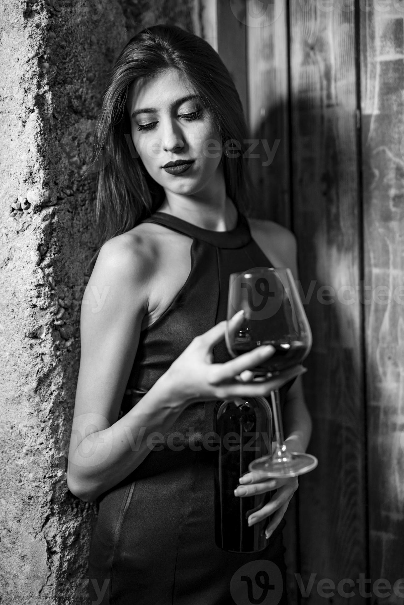 female fashionable model holding glass of wine. woman drinking wine. 15985993 Stock Photo at ...