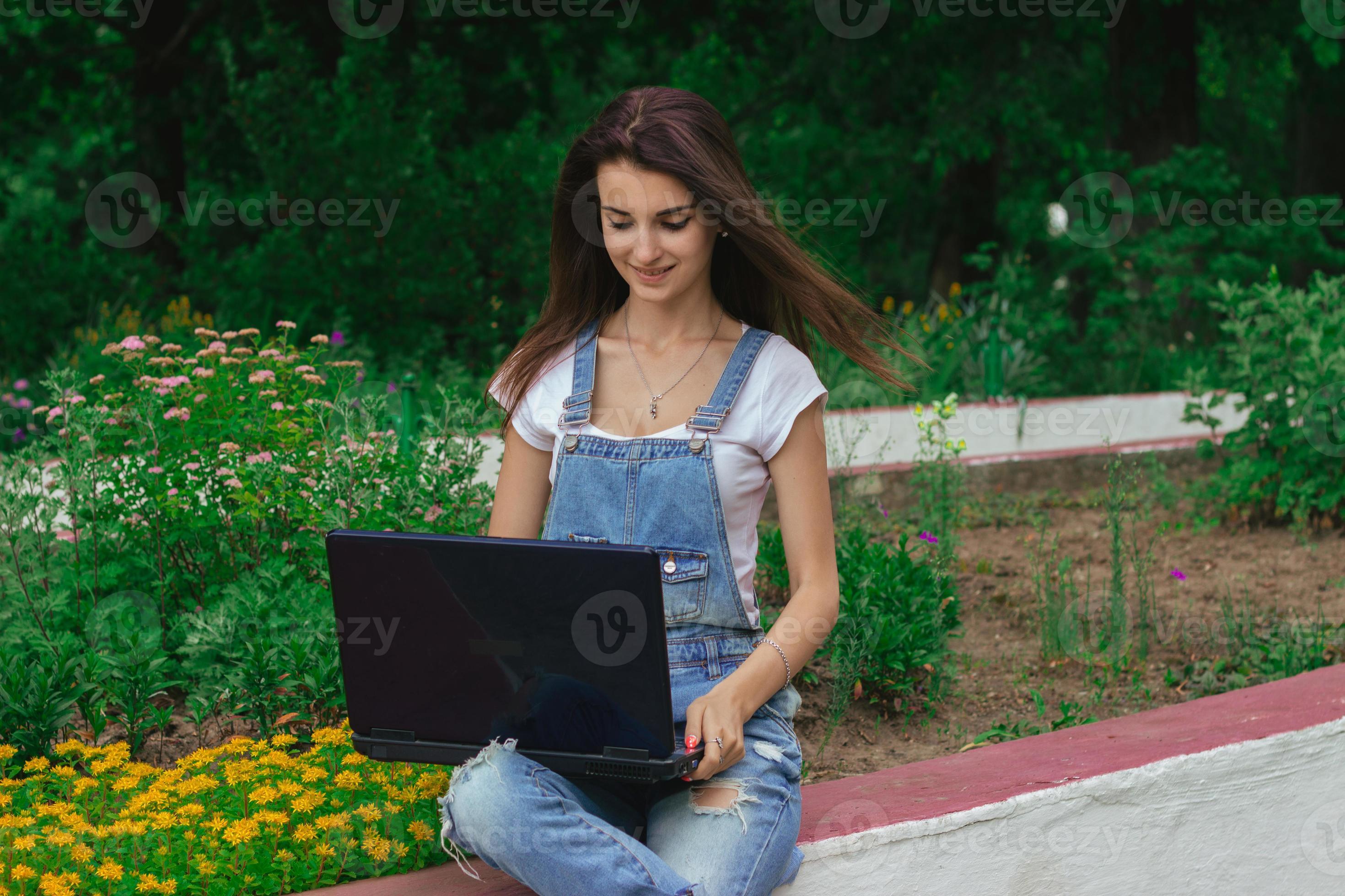 Smiling Beautiful Lady Sitting In A Flower Park On Street Prints On