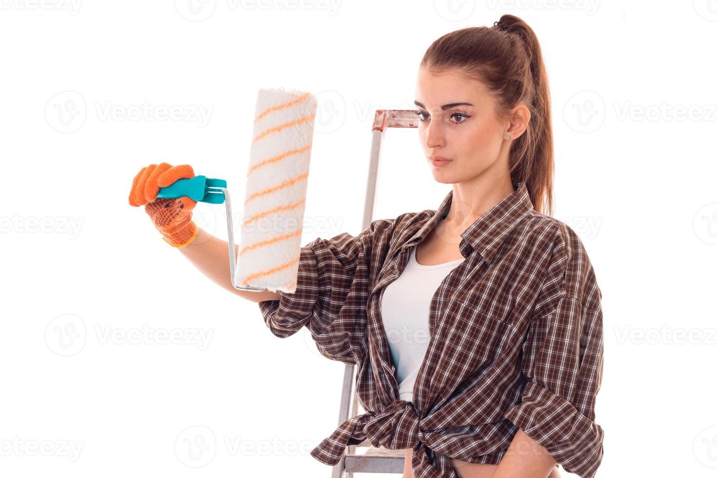 charming brunette lady builder makes renovation isolated on white ... charming brunette lady builder makes renovation isolated on white ...