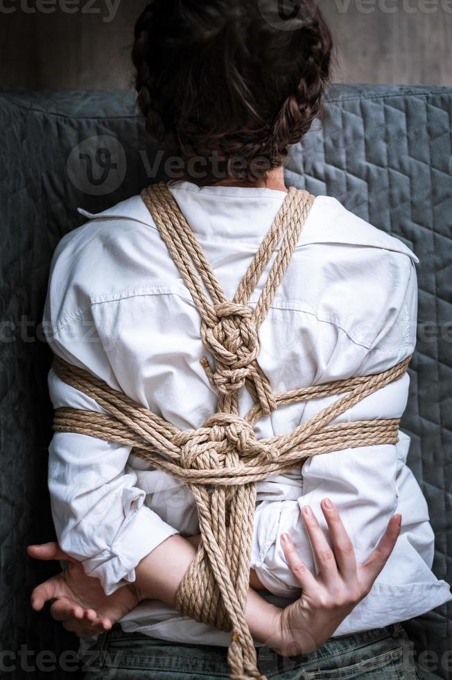 Woman bound with a rope in Japanese technique shibari 16106525 Stock Photo at Vecteezy