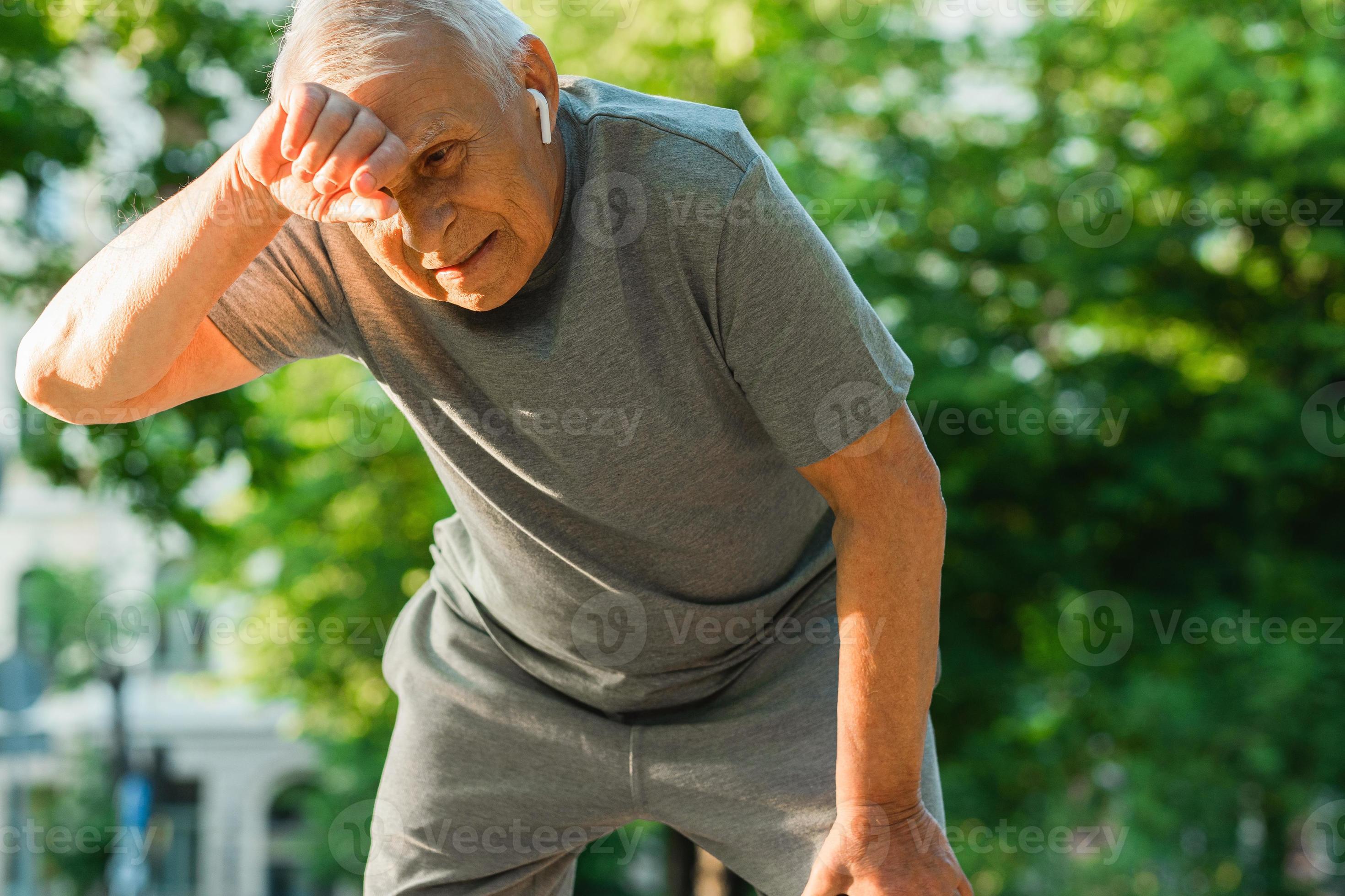 Exhausted elderly man after his jogging workout 16236325 Stock Photo at ...