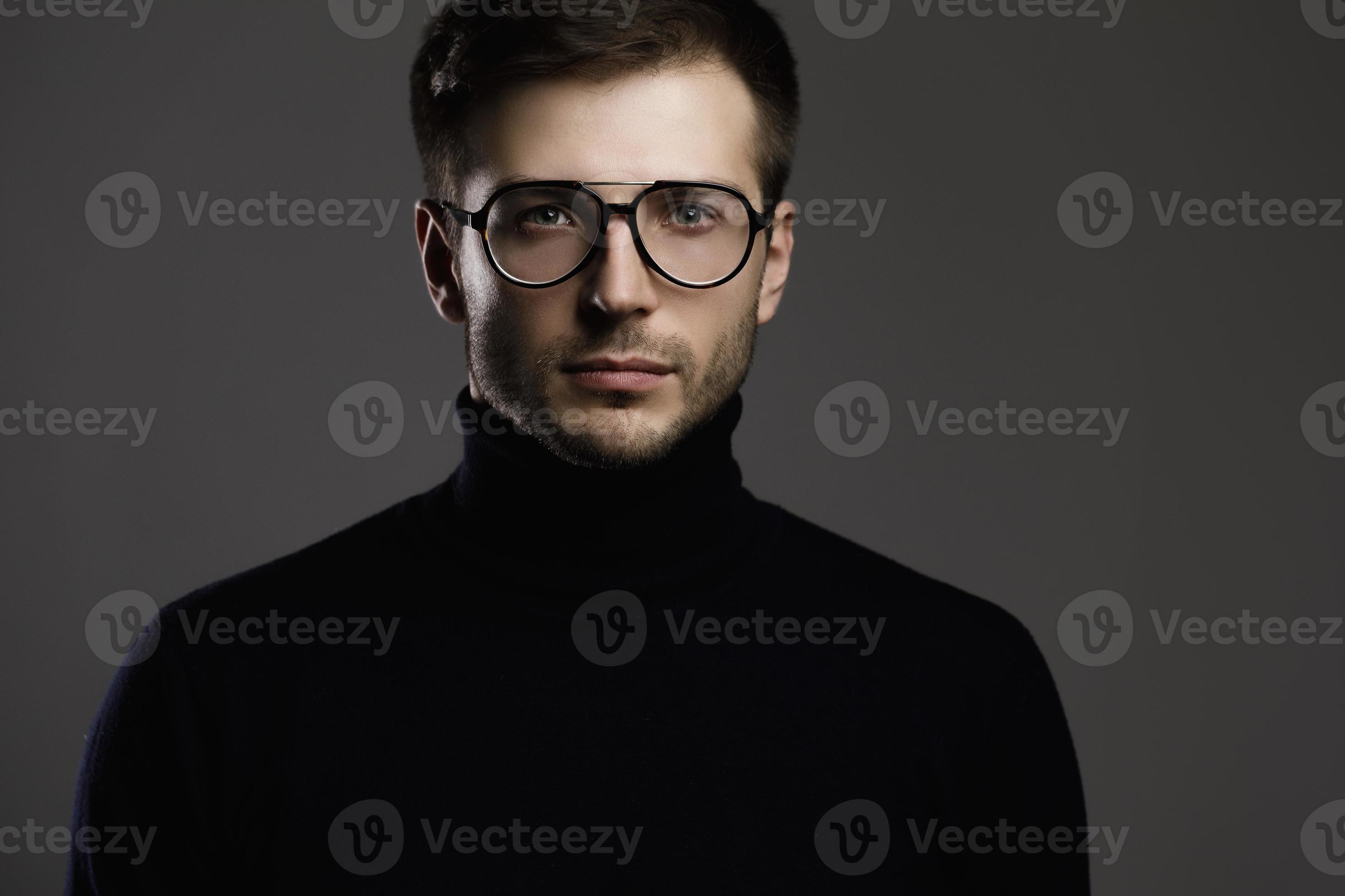 Young smart man wearing glasses and a folded polo neck 16237070 Stock ...
