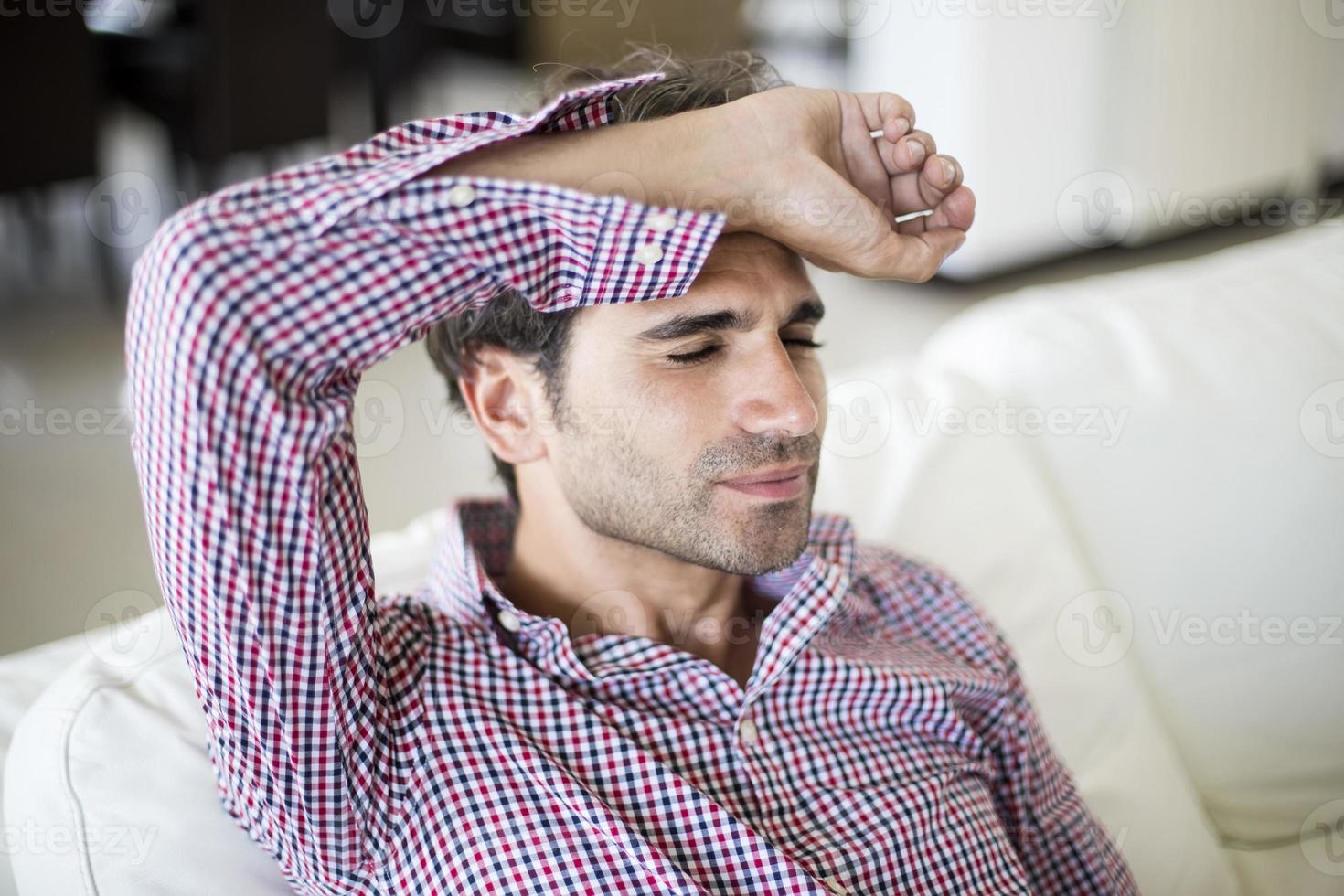 Tired young man 16388442 Stock Photo at Vecteezy