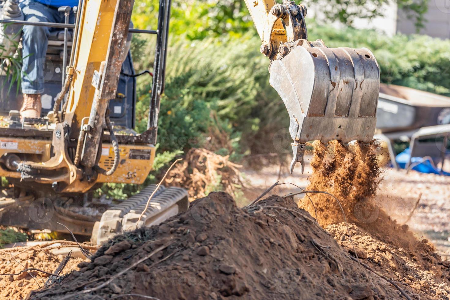 Working Excavator Tractor Digging A Trench At Construction Site ...