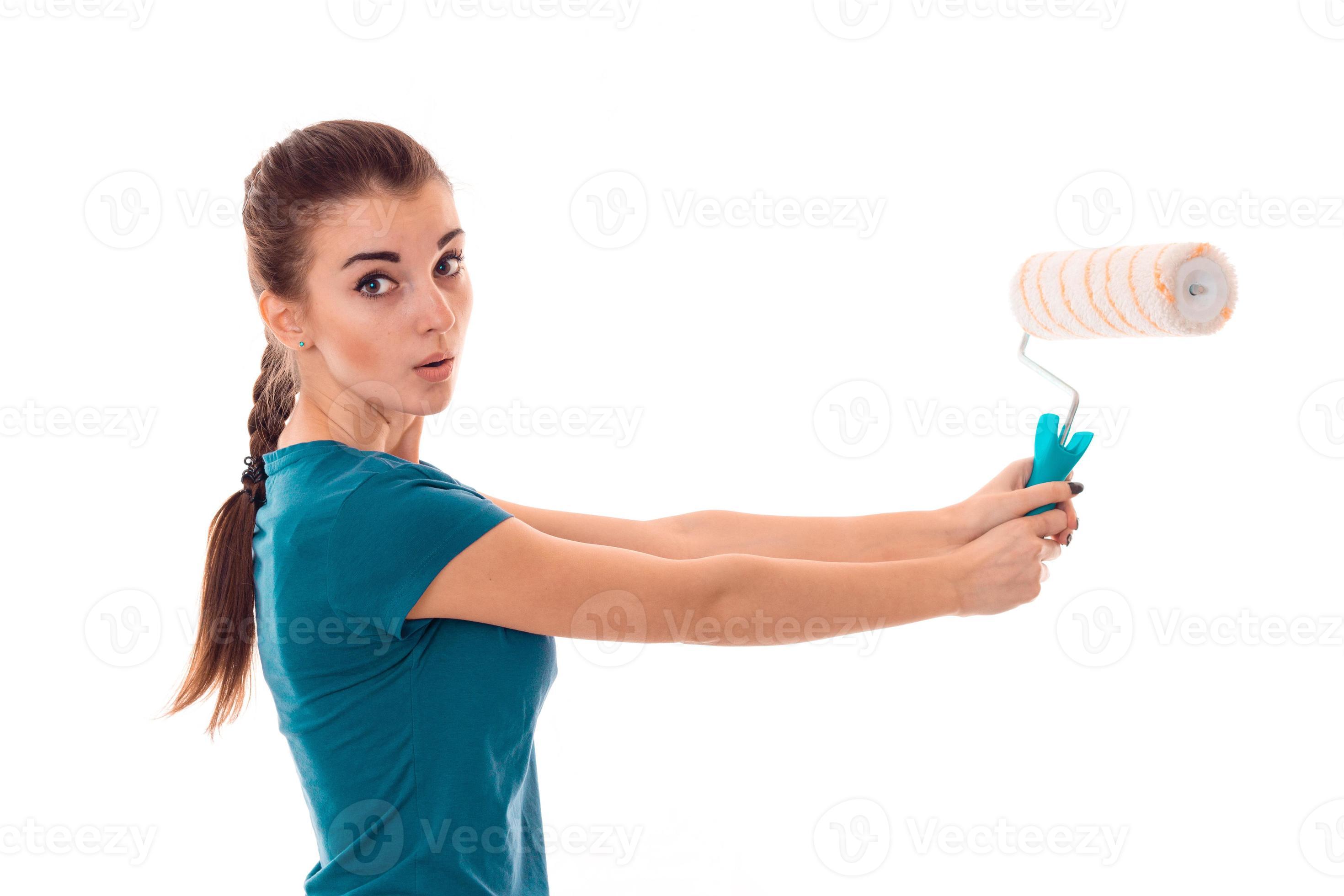 surprised brunette woman builder makes renovation isolated on white ... surprised brunette woman builder makes renovation isolated on white ...