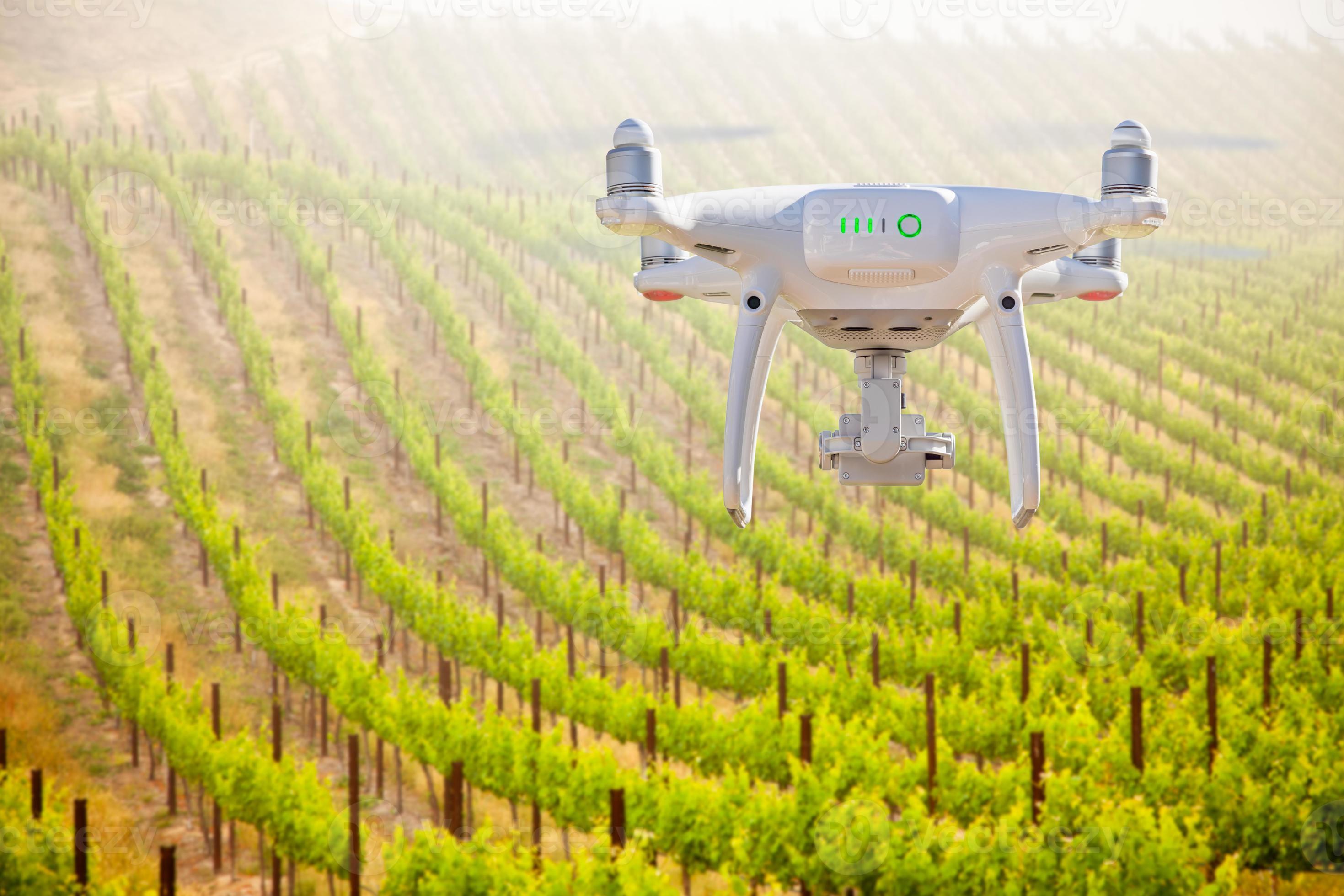 Unmanned Aircraft System UAV Quadcopter Drone In The Air Over Grape Vineyard Farm 16475884 Stock ...