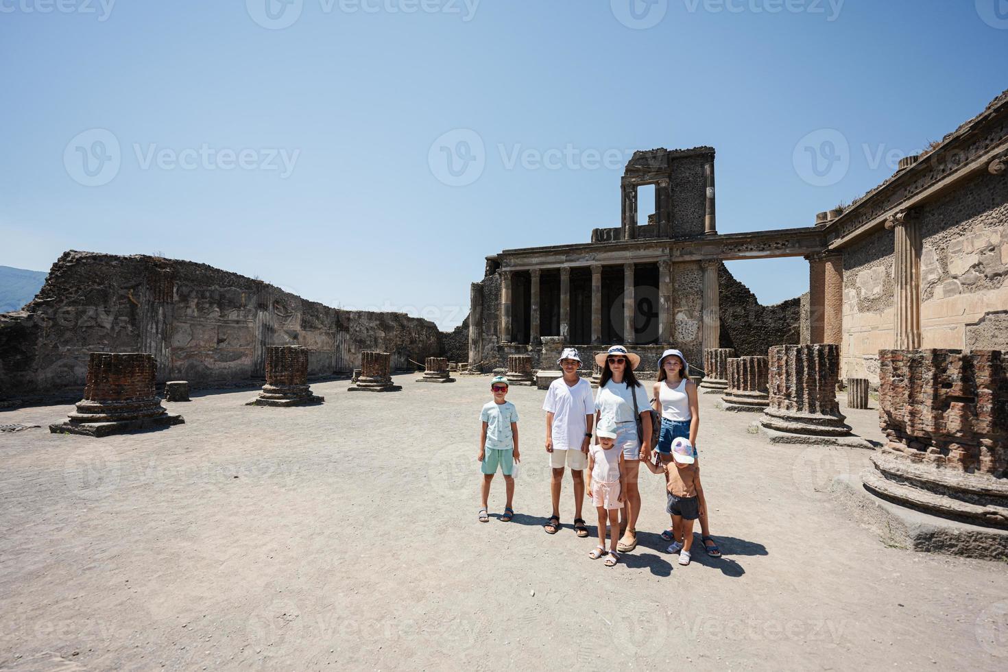 Family tourist visit Pompeii ancient city, Italy. 16480814 Stock Photo ...