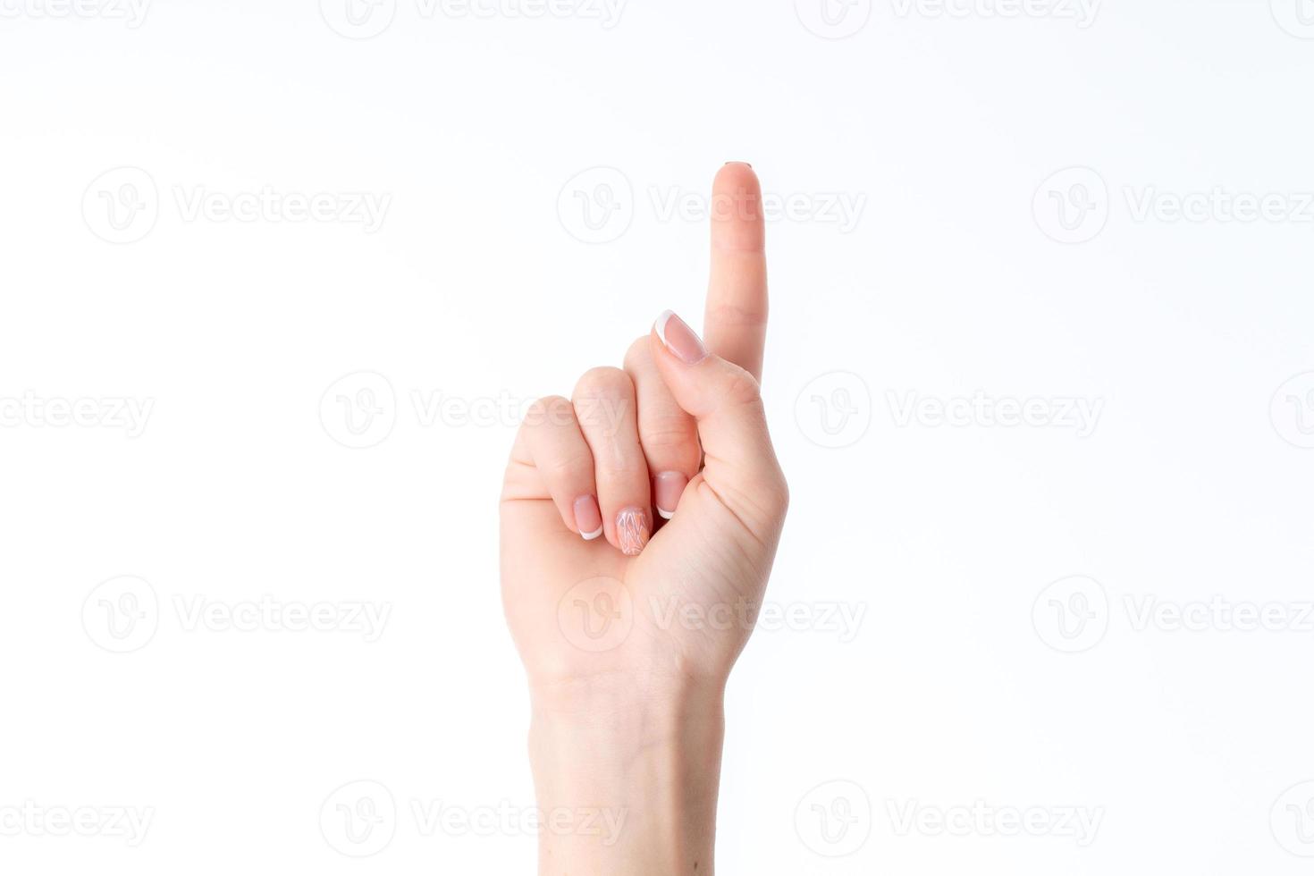 female hand showing the gesture with raised up one finger isolated on ... female hand showing the gesture with raised up one finger isolated on ...