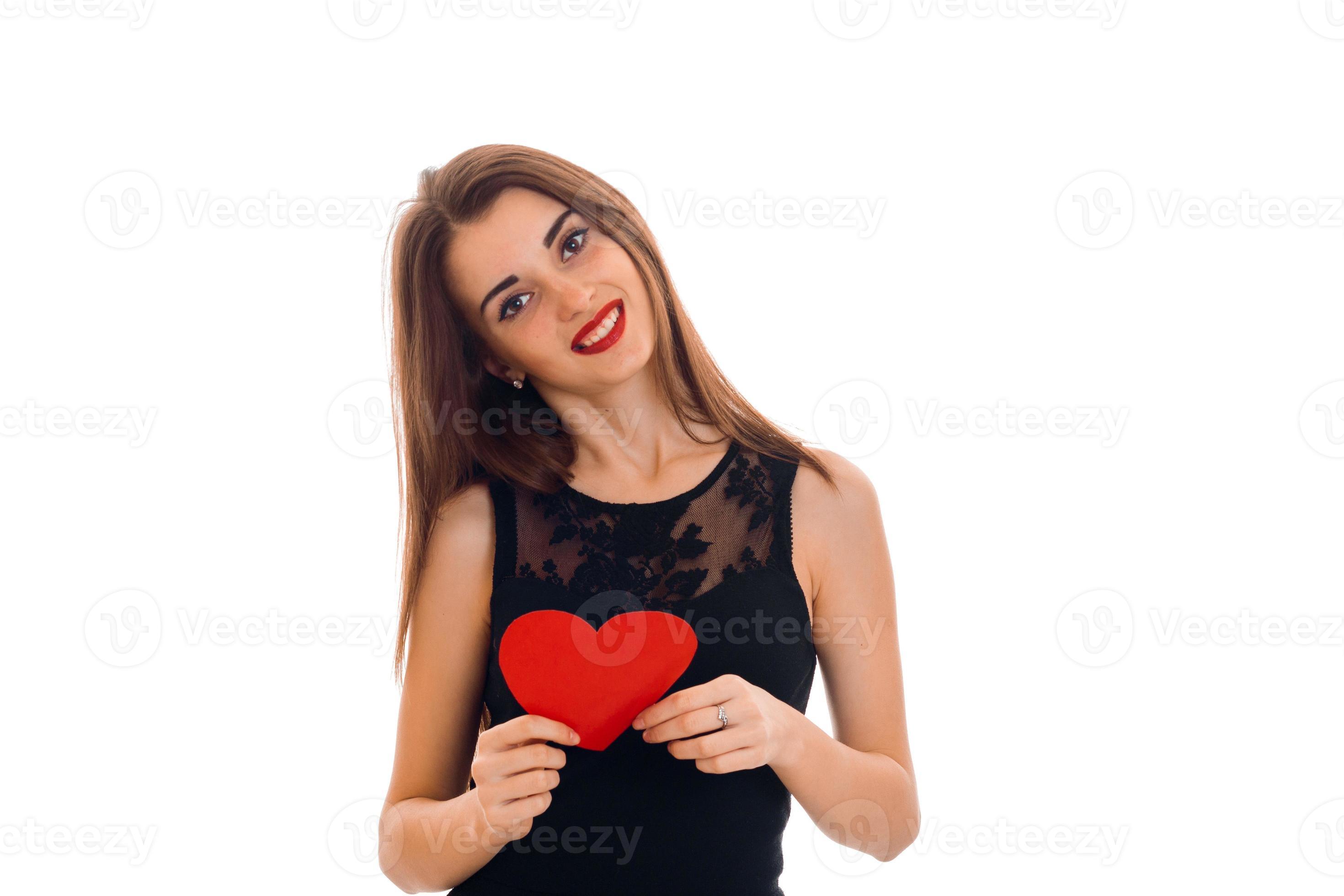 Beautiful Young Girl Cocked Her Head In Black Dress Smiles And Keeps A Postcard Sweetheart