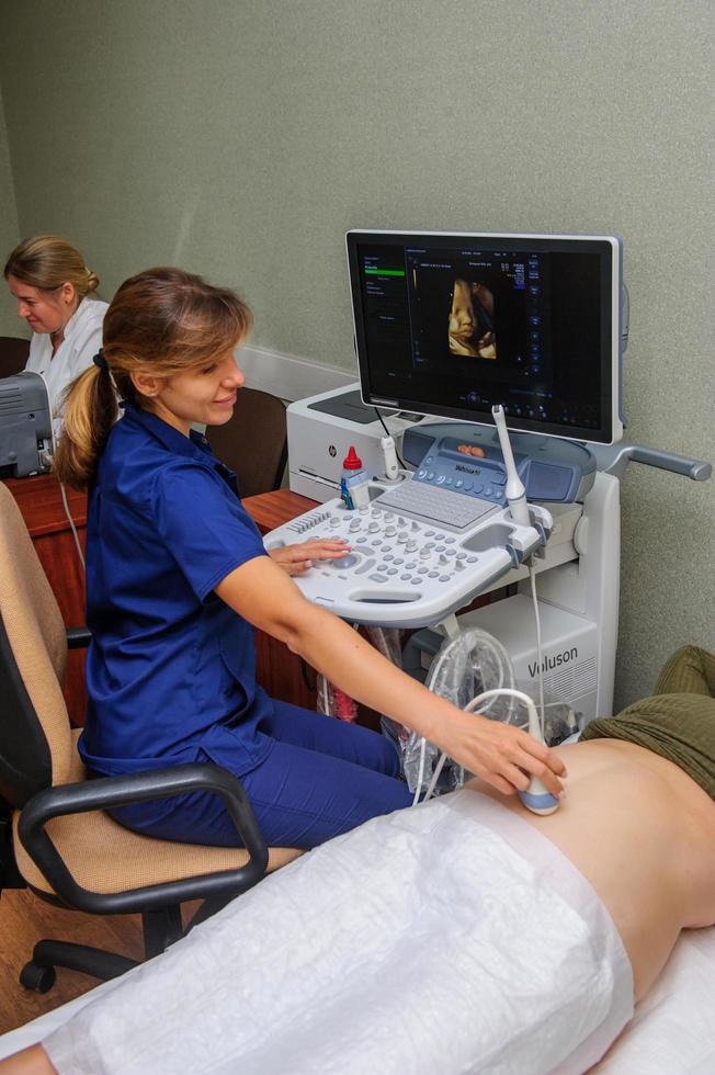 VINNITSA UKRAINE OCTOBER 25 of 2022 Medical specialists near ultrasound ... VINNITSA UKRAINE OCTOBER 25 of 2022 Medical specialists near ultrasound ...