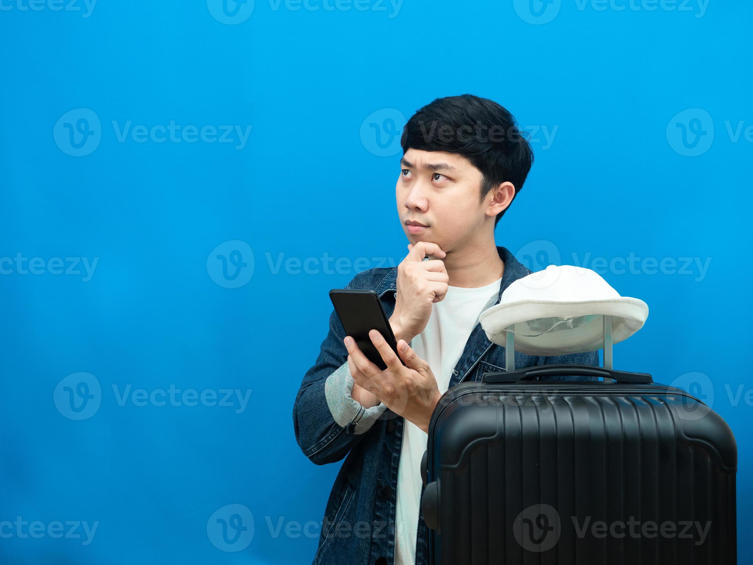 Man Holding Mobile Phone Gesture Thinking And Looking At Copy Space