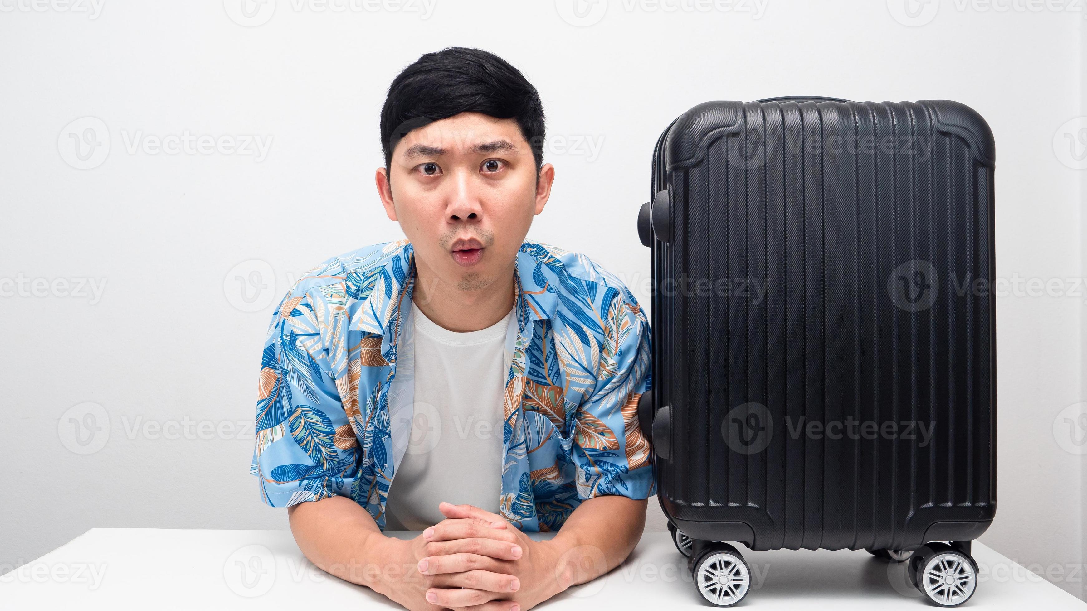 Man blue shirt with luggage excited emotion with holiday 16684588 Stock Photo at Vecteezy