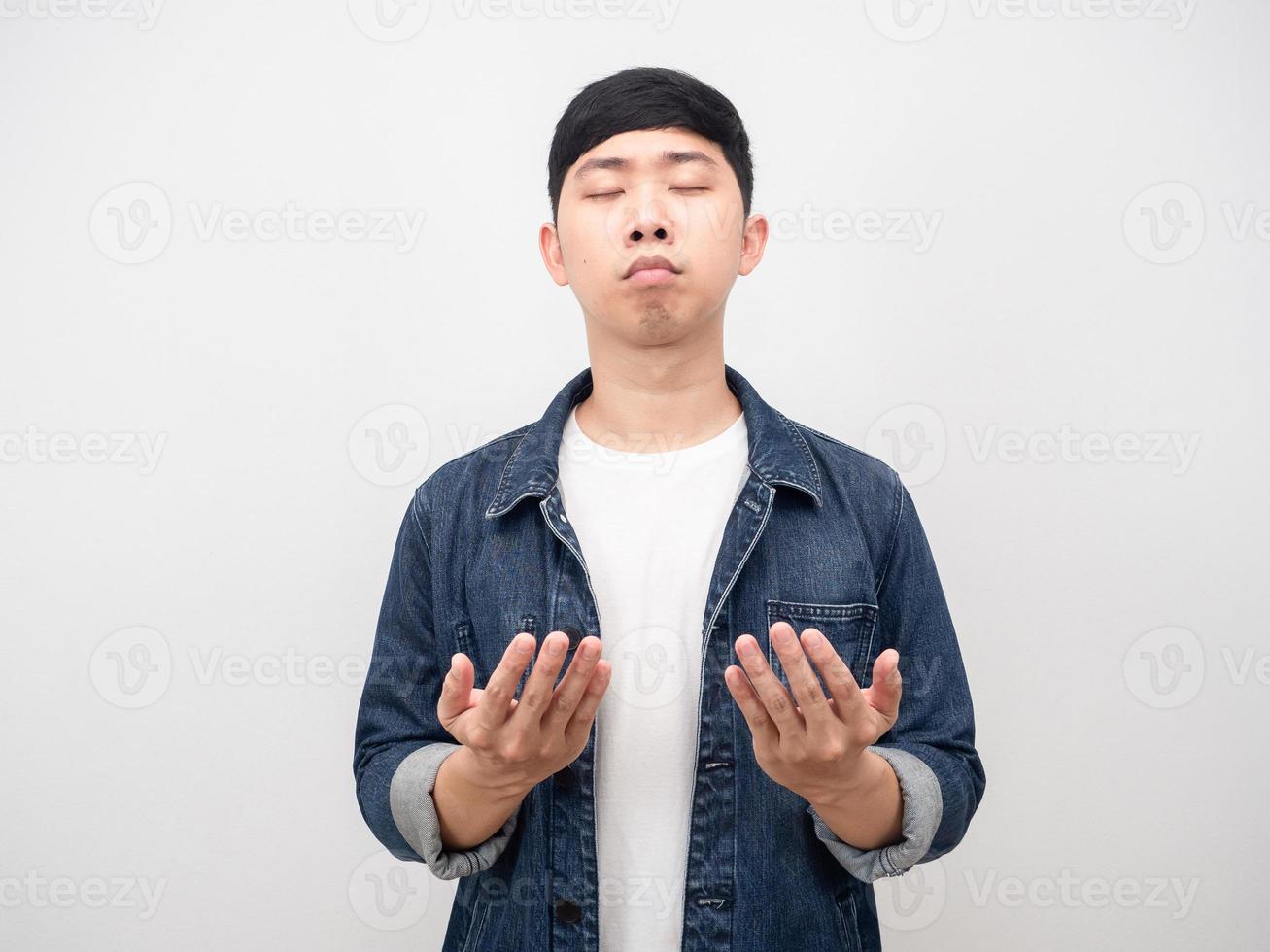 Asian man hand up meditate close eye for calm,Man jean shirt pray hand 16686672 Stock Photo at ...