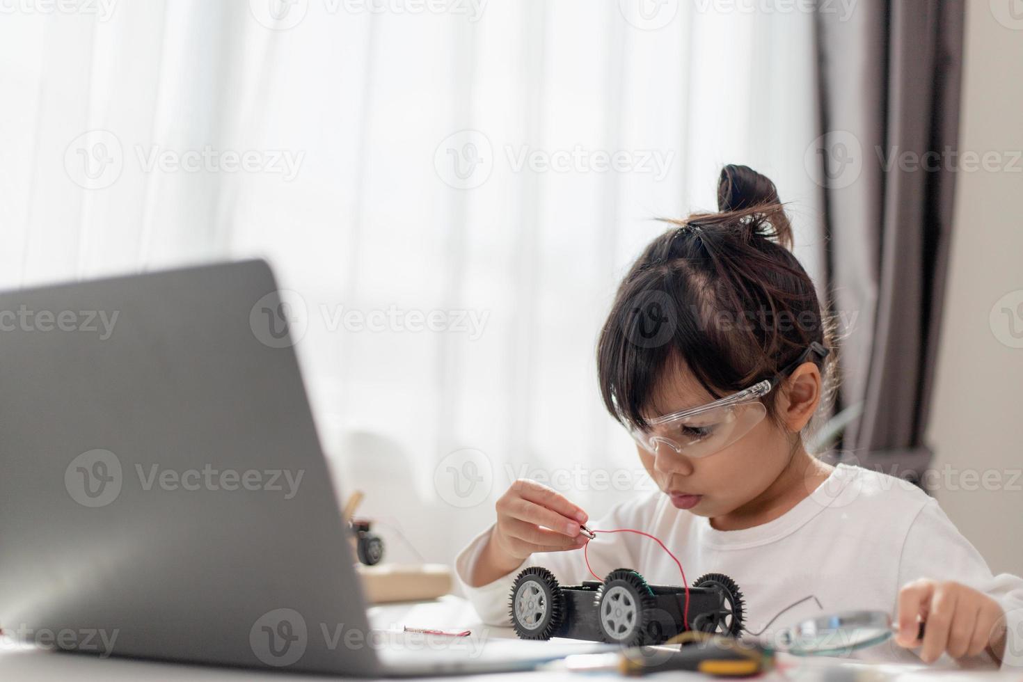 Asia students learn at home in coding robot cars and electronic board ...