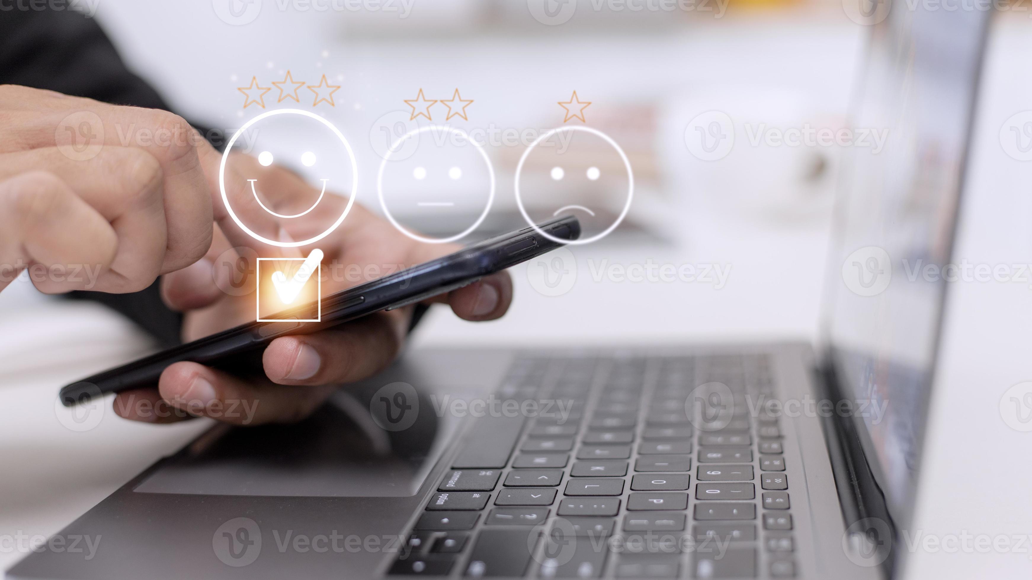 Customer service evaluation concept. using a smartphone is pressing ...