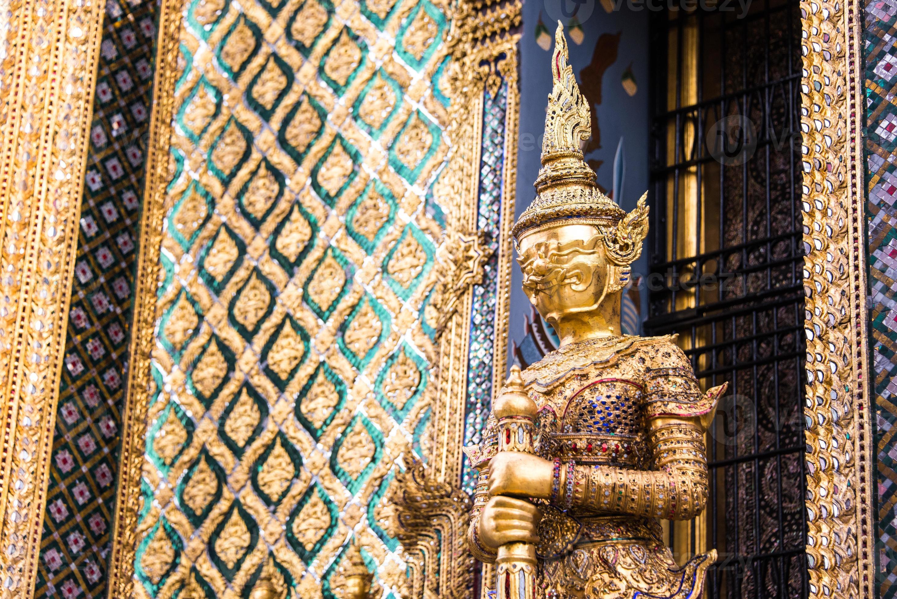 A statue of Yaksa on temple guard at the Temple of the Emerald Buddha, Bangkok, Thailand ...
