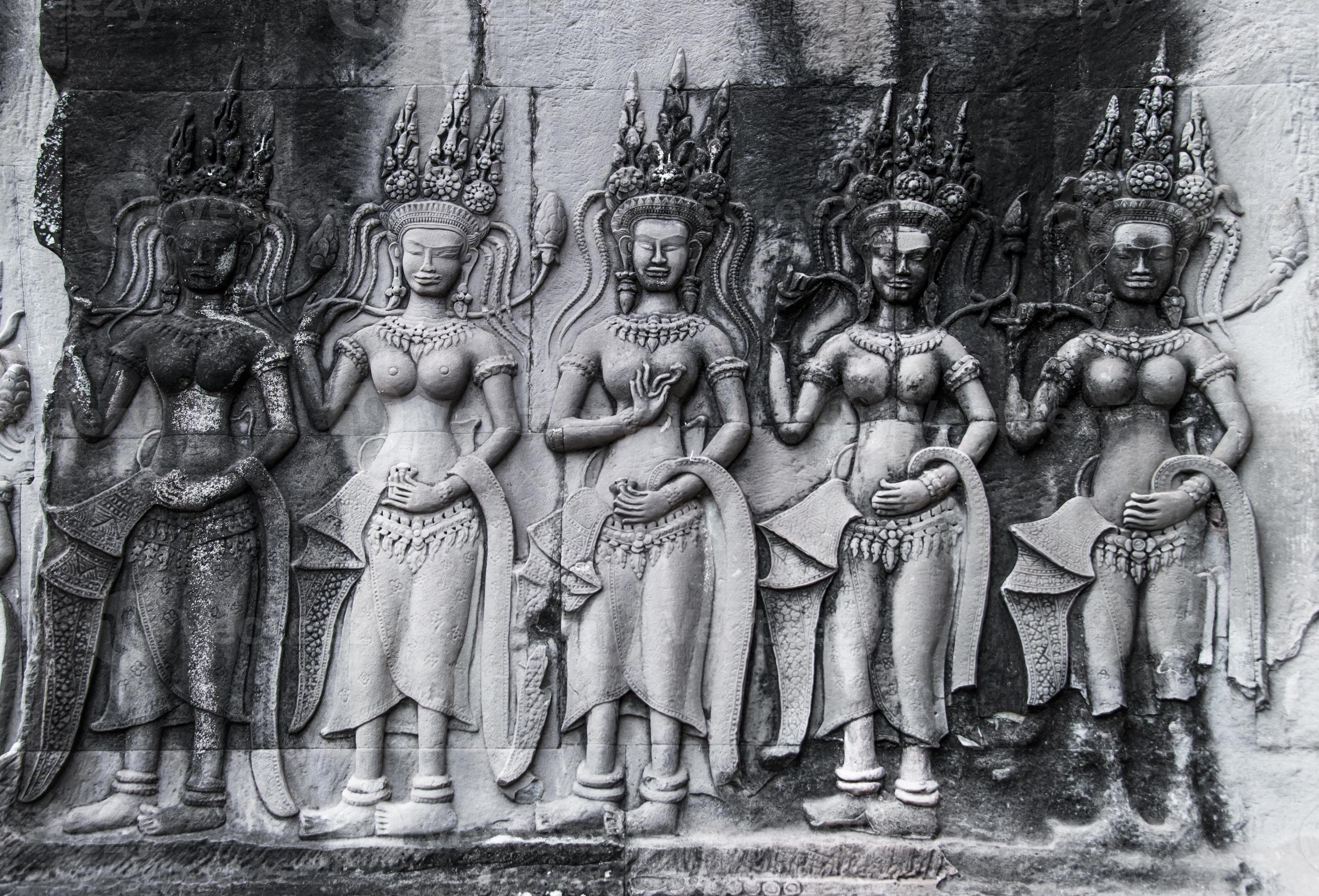 Detail of stone carvings of Apsara is a beautiful and seductive girl of Hindu mythology at ...