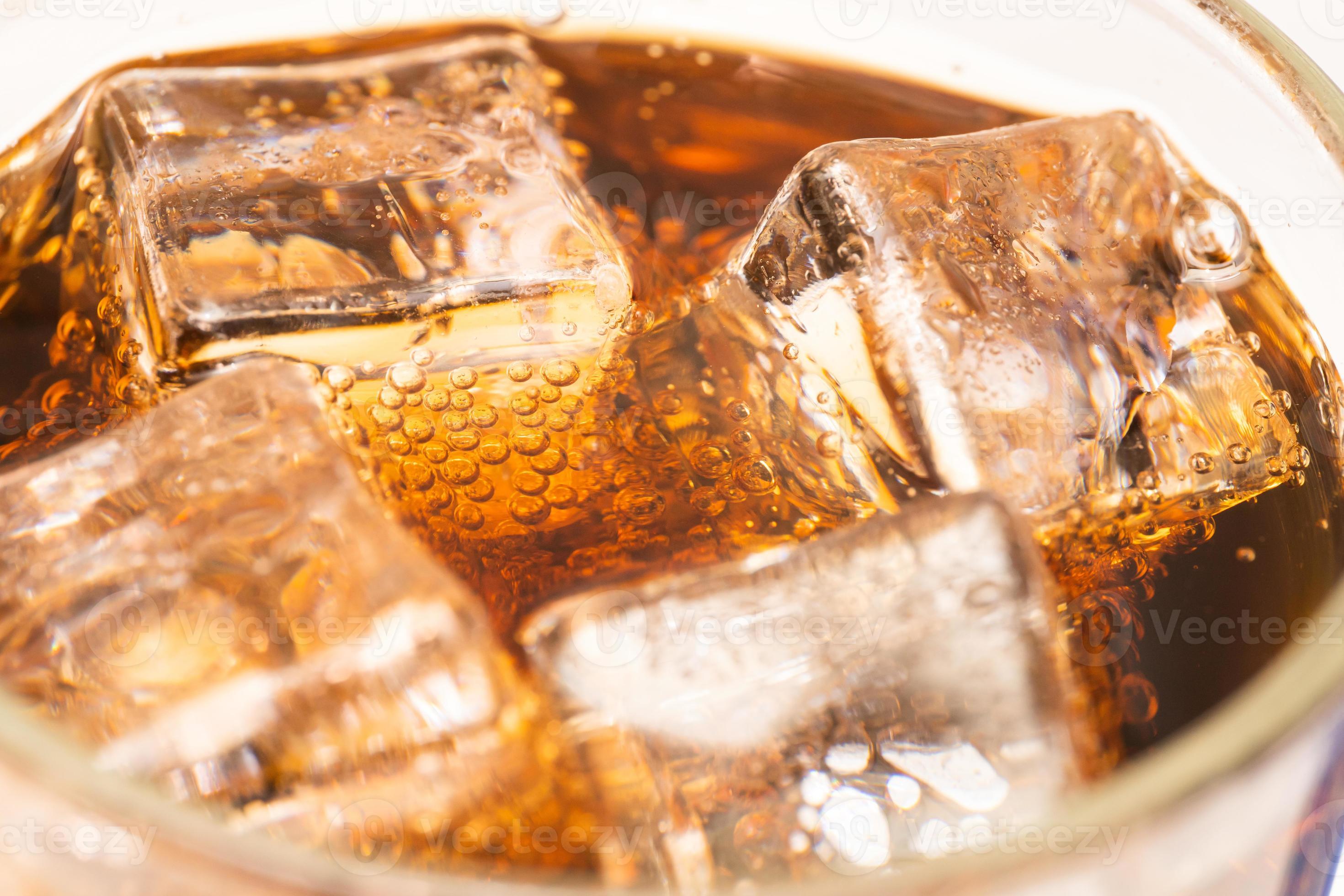 Close up Cola with Ice and bubbles in glass. Ice cubes in cola beverage. 16759427 Stock Photo at ...