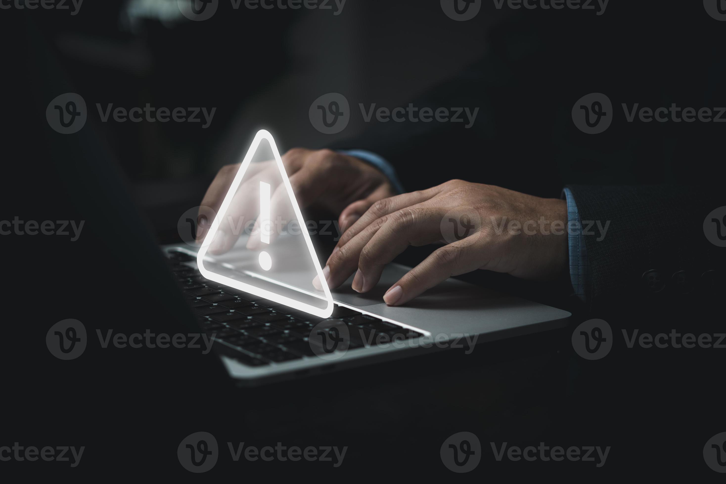 Businessman Programmer Developer Using Laptop Computer With Triangle Caution Warning Sign For