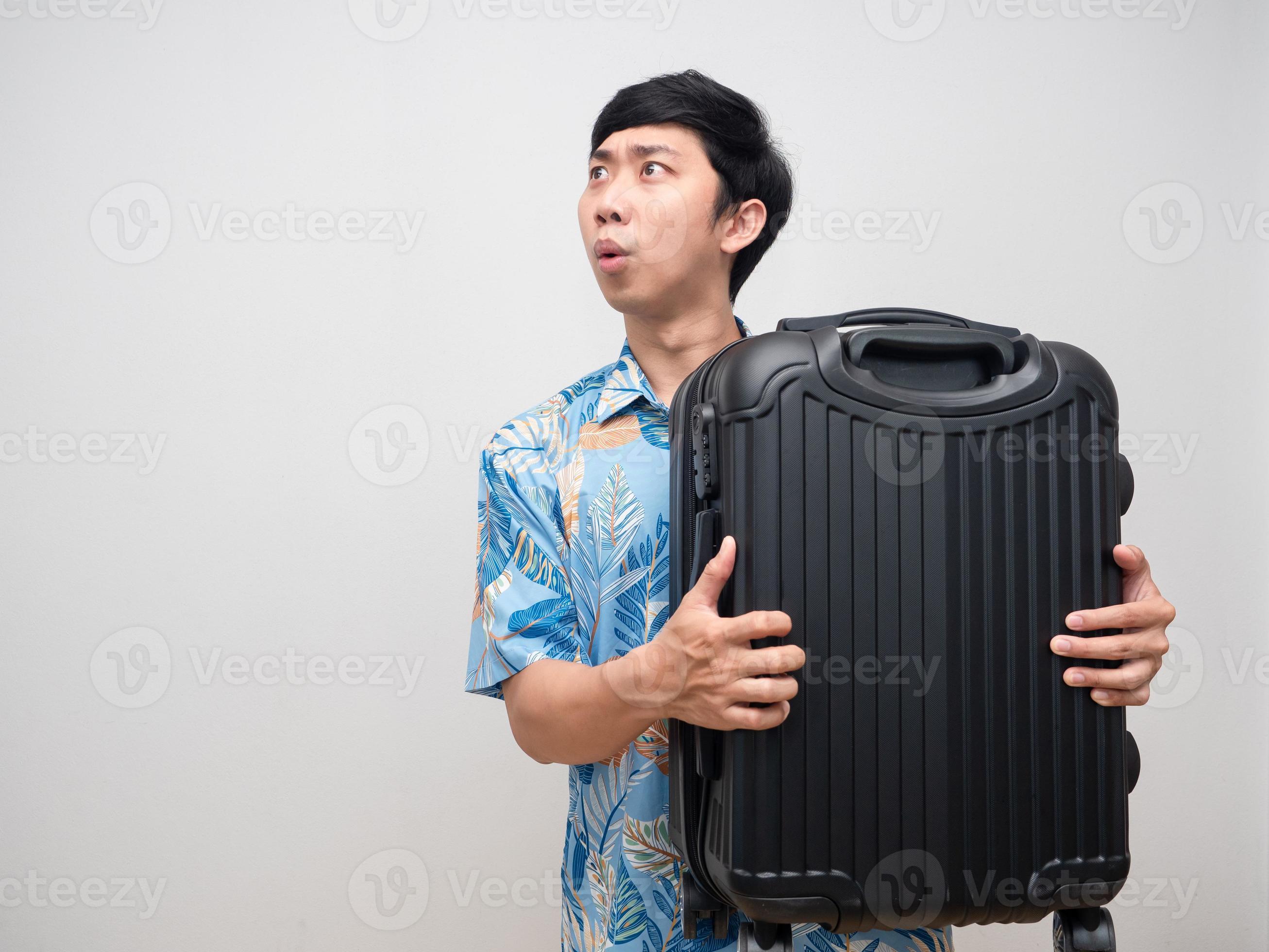 Young man beach shirt holding laggage feels excited looking copy space 16790445 Stock Photo at ...