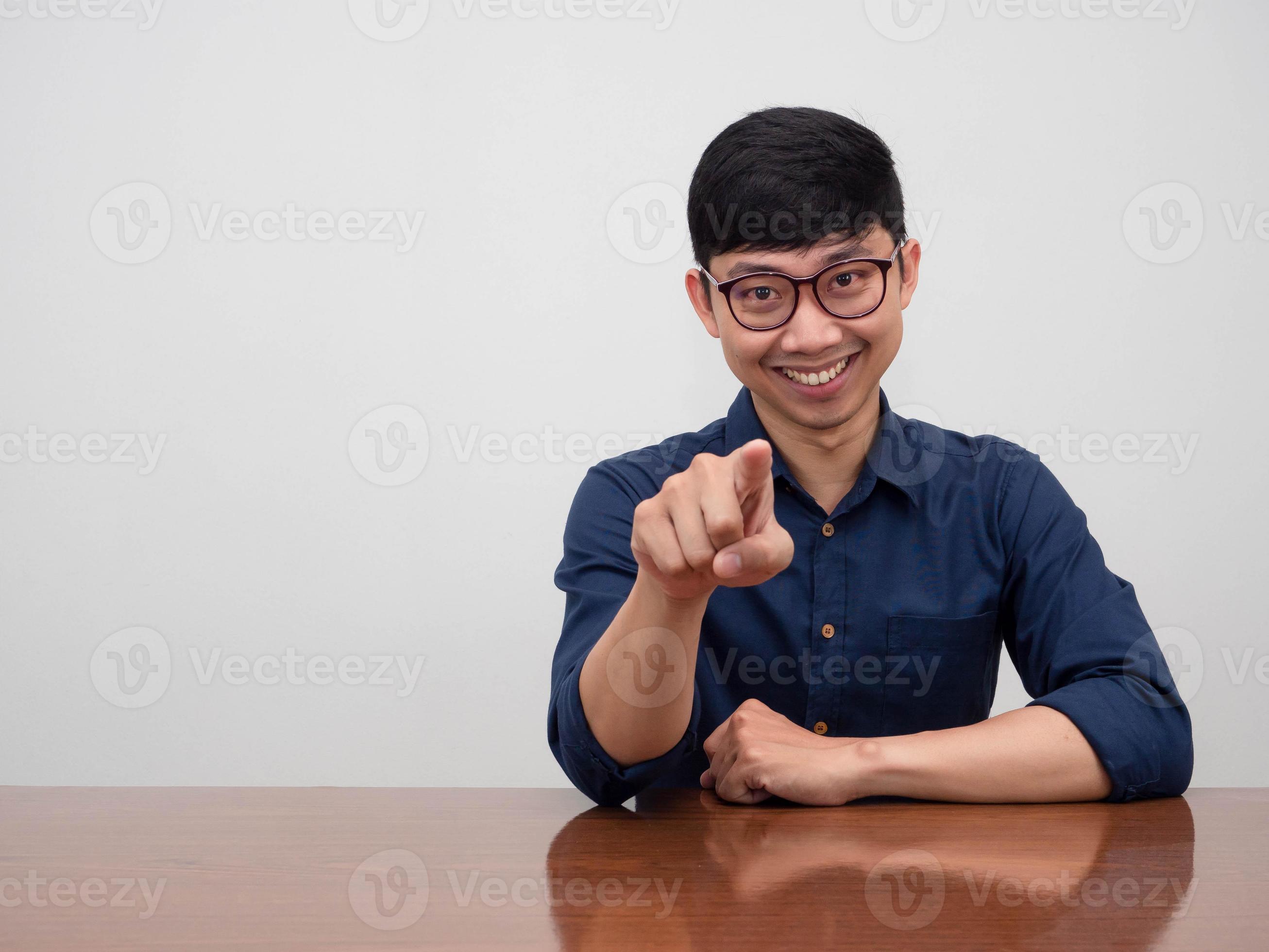 Positive Asian Businessman Wear Glasses Sit At The Desk Confident Smile
