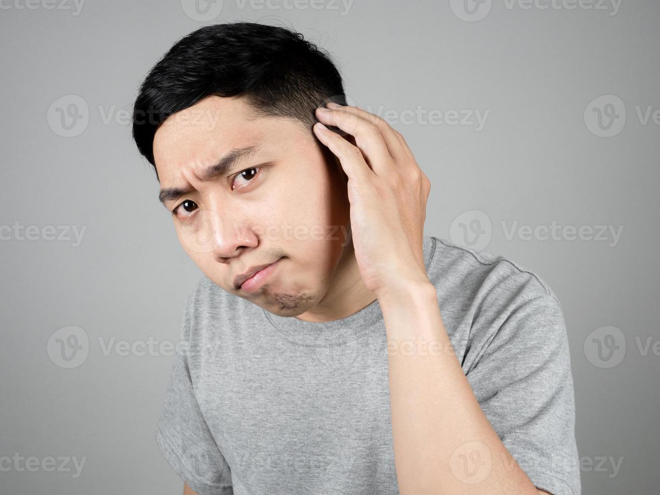 Close up asian man find grey hair on his head feels worried isolated ... Close up asian man find grey hair on his head feels worried isolated ...