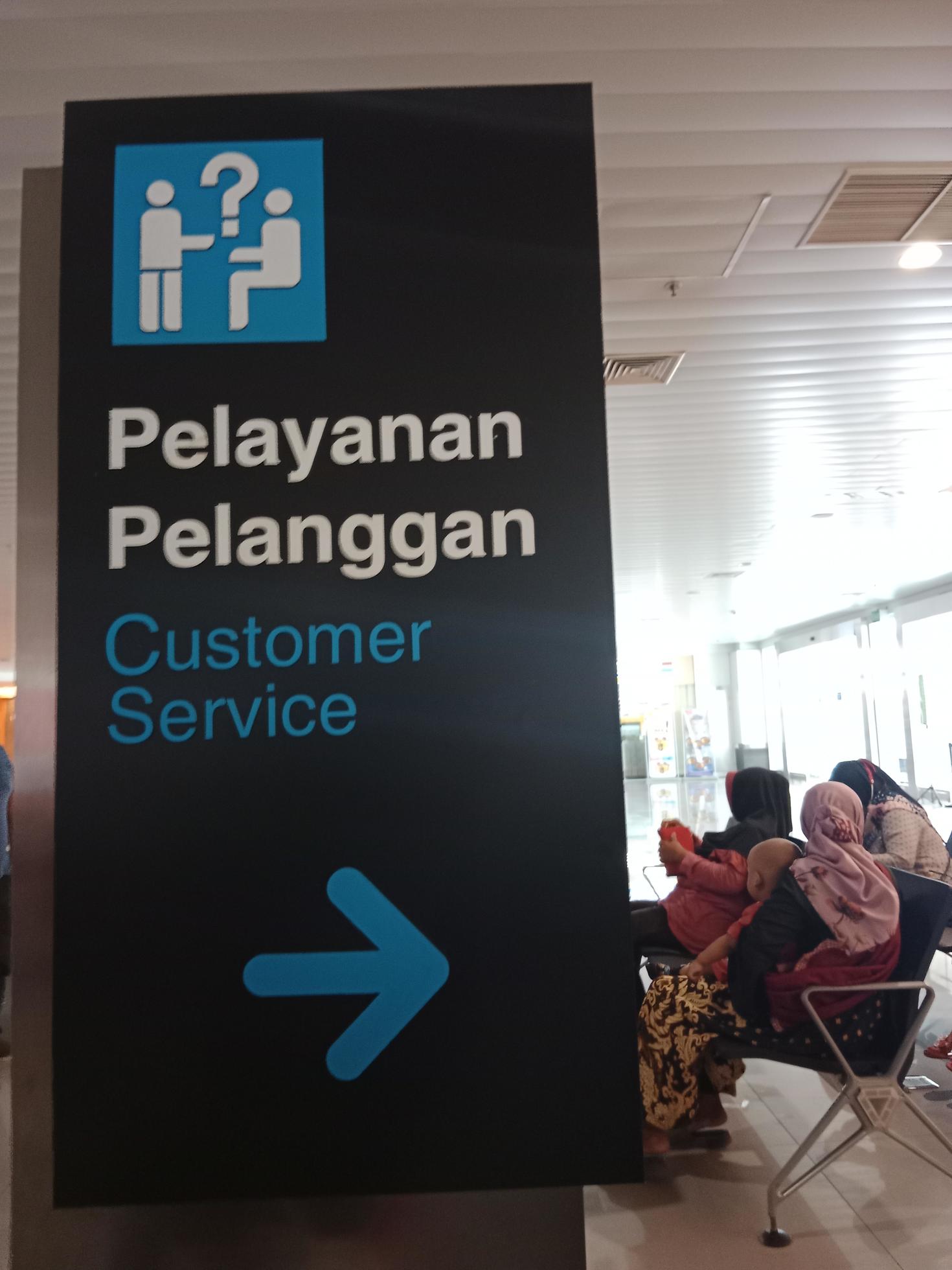 Indonesia, ahmad yani airport, 11-23-2022, costumer service board. information center service ...