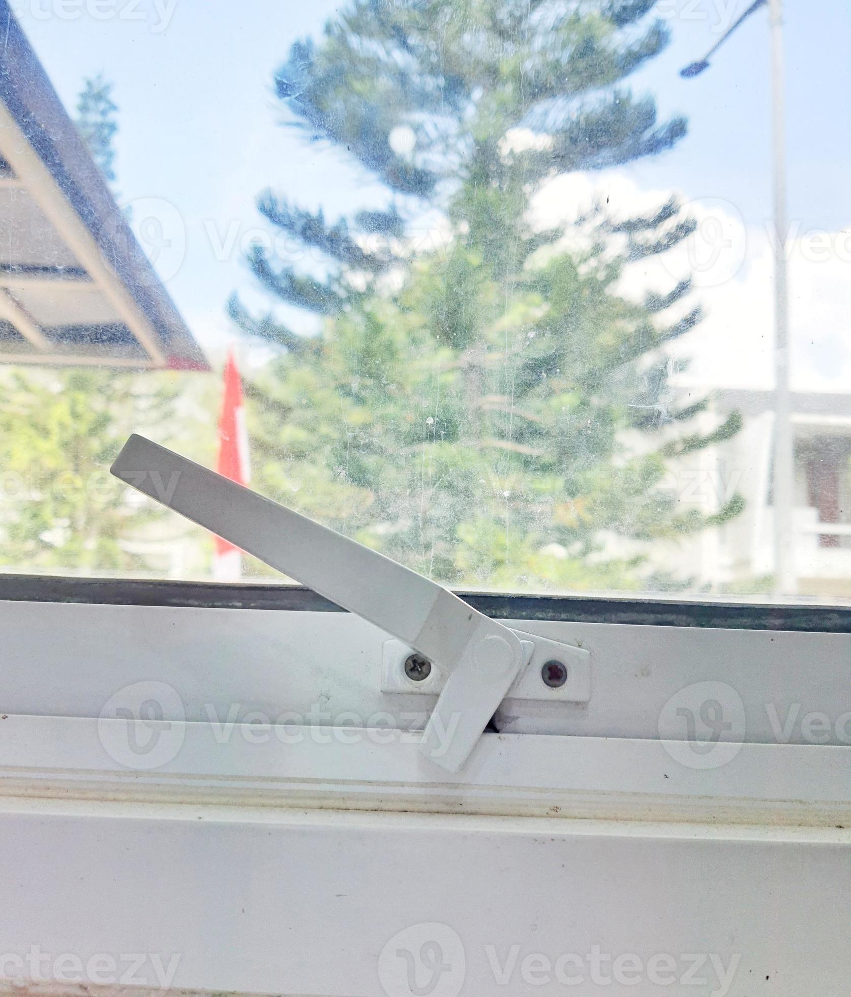 Photo of an aluminum window handle which has the function of opening ...