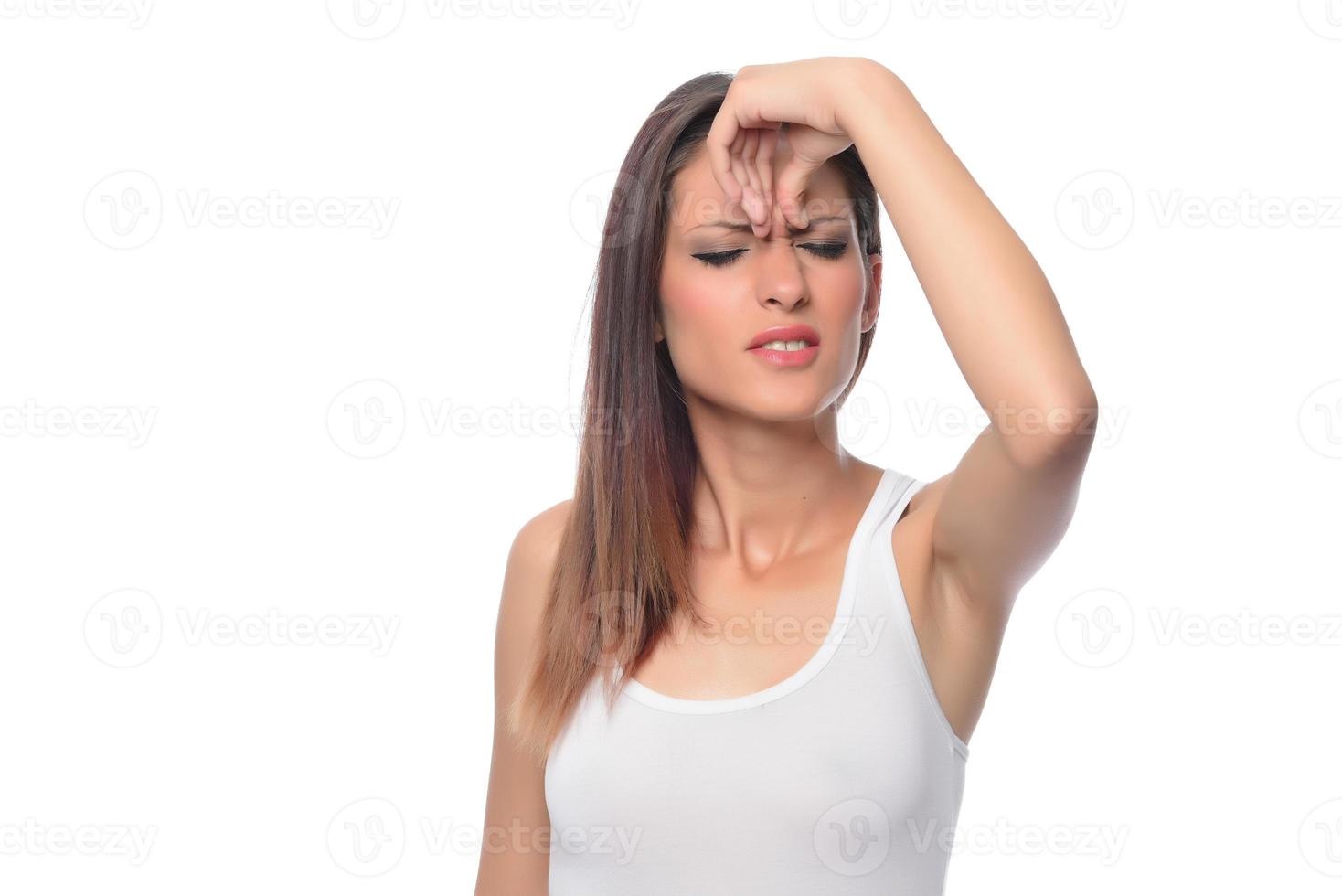 Sad tired young woman touching forehead having headache migraine or ...