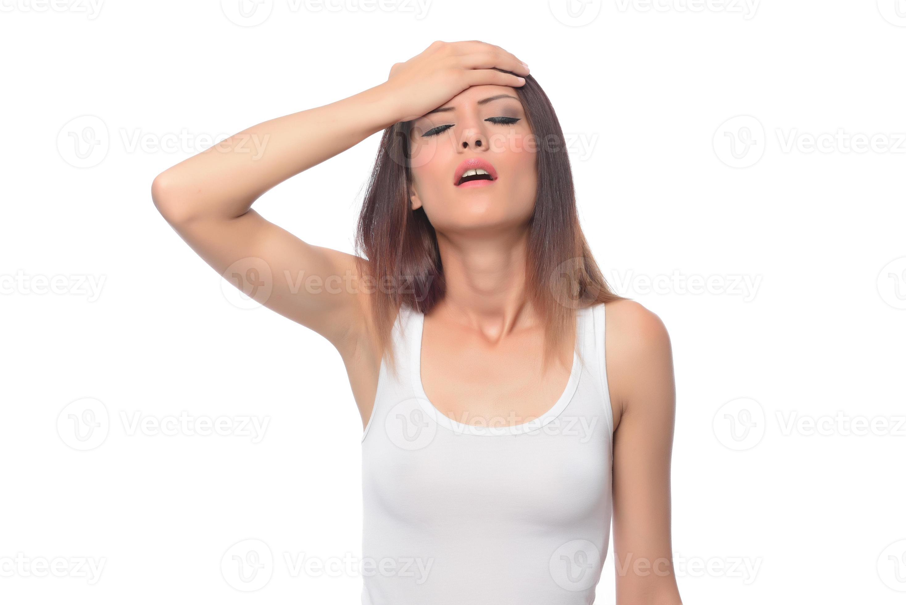 Sad tired young woman touching forehead having headache migraine or ...