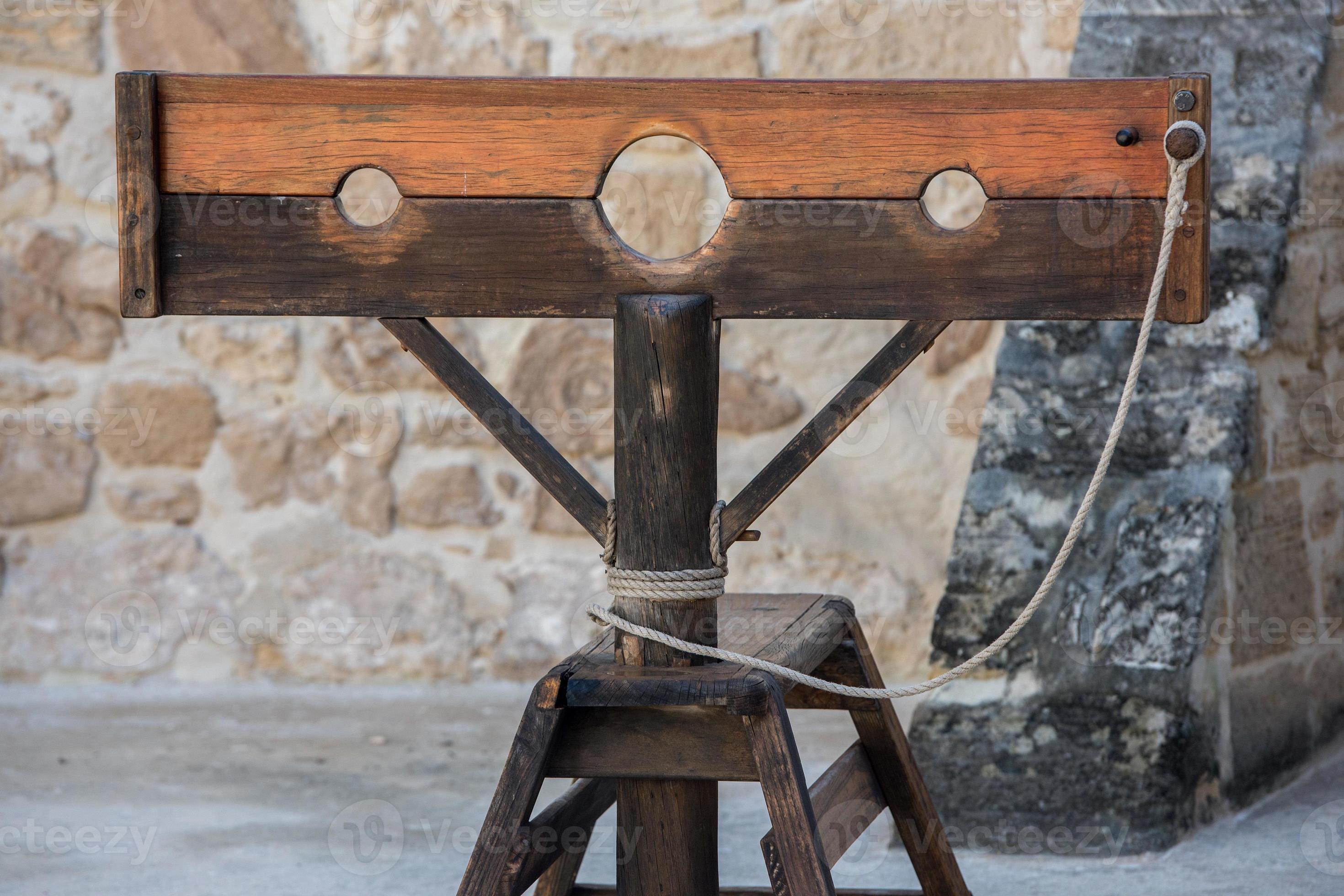 Old pillory on castle stone wall background 17233588 Stock Photo at ... Old pillory on castle stone wall background 17233588 Stock Photo at ...