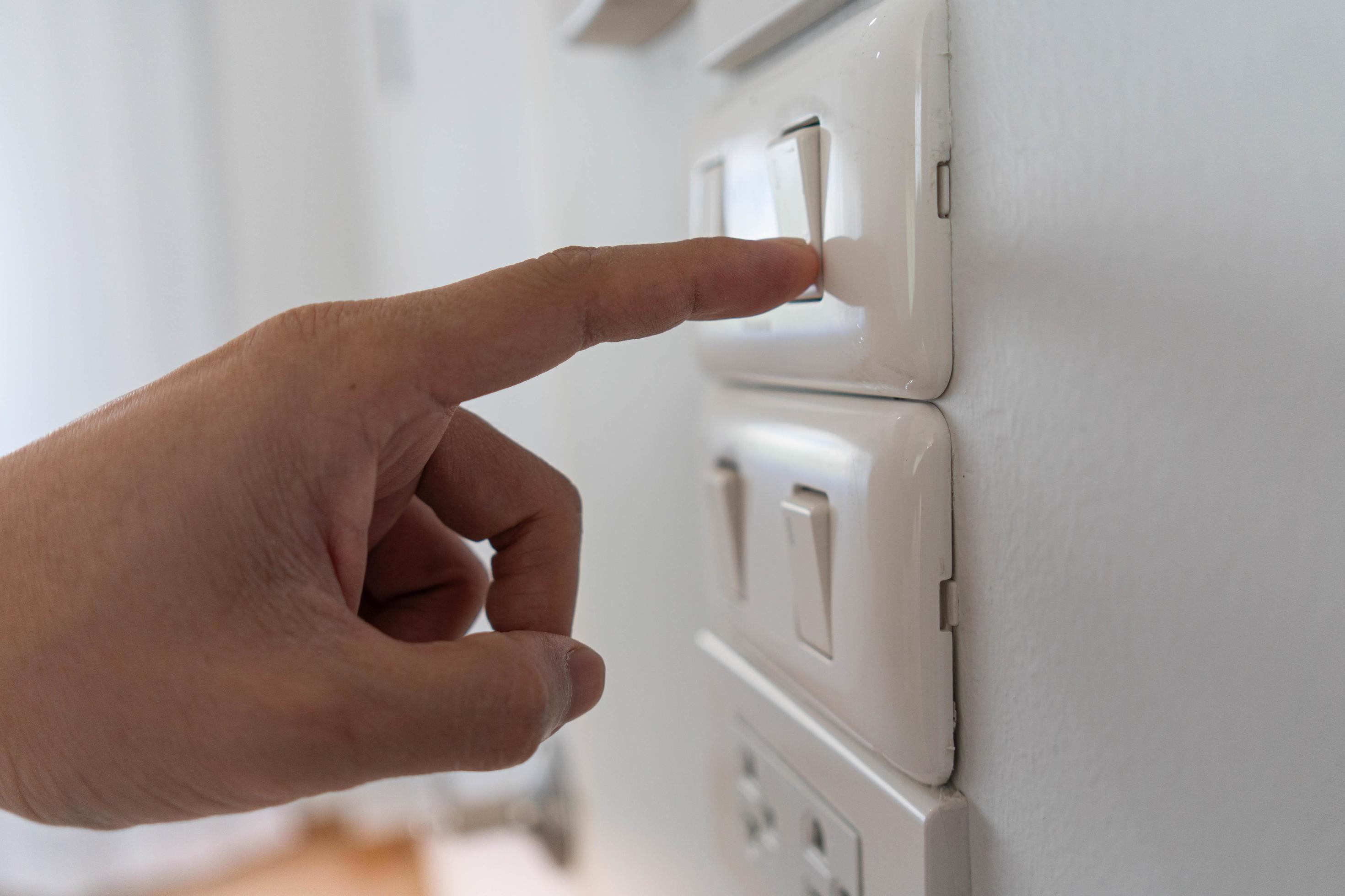 Save Electricity Energy Saving And Environmental Protection Man S Finger Press On The Button