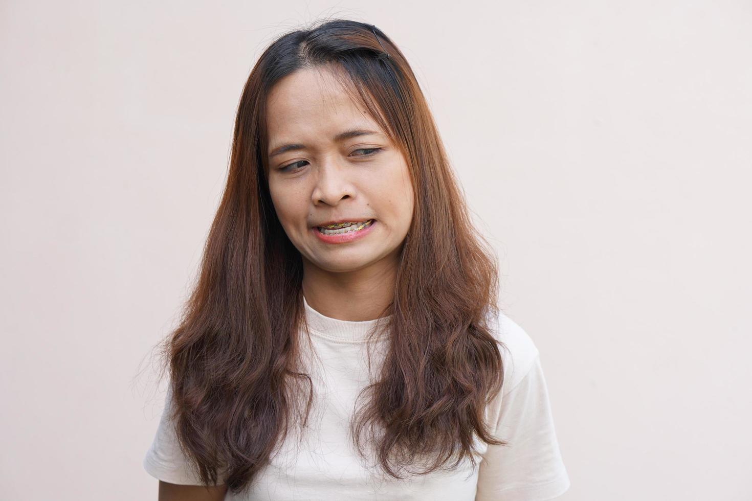 Asian women Stressed out from work, so he looks bored. 17399535 Stock ...