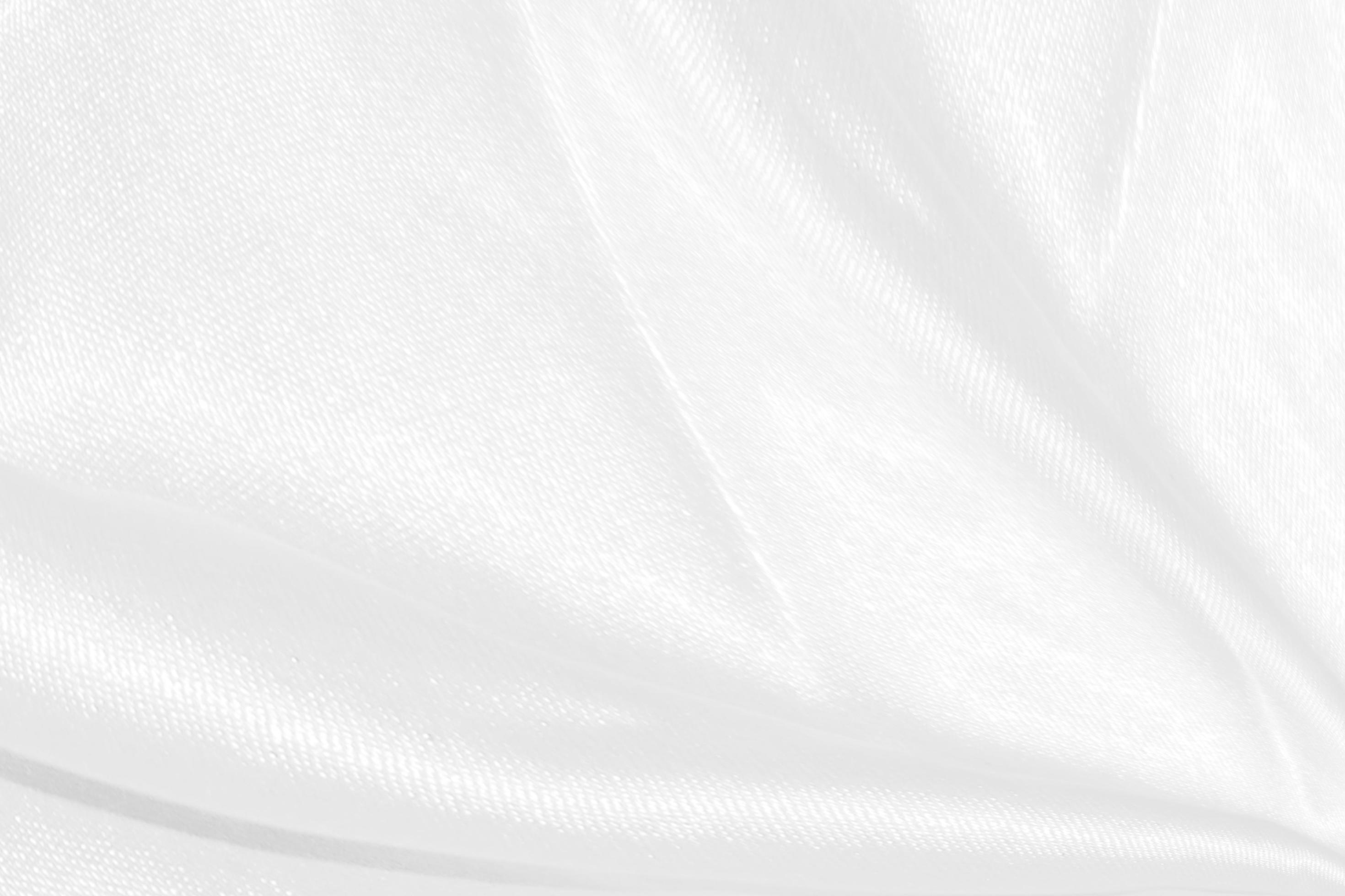Smooth elegant white silk or satin luxury cloth texture can use as ...