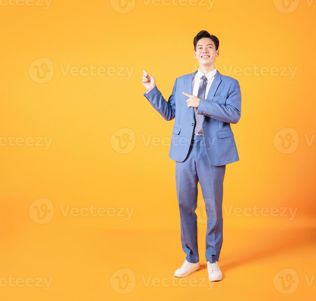 Photo of young Asian business man on background 17563309 Stock Photo at ...