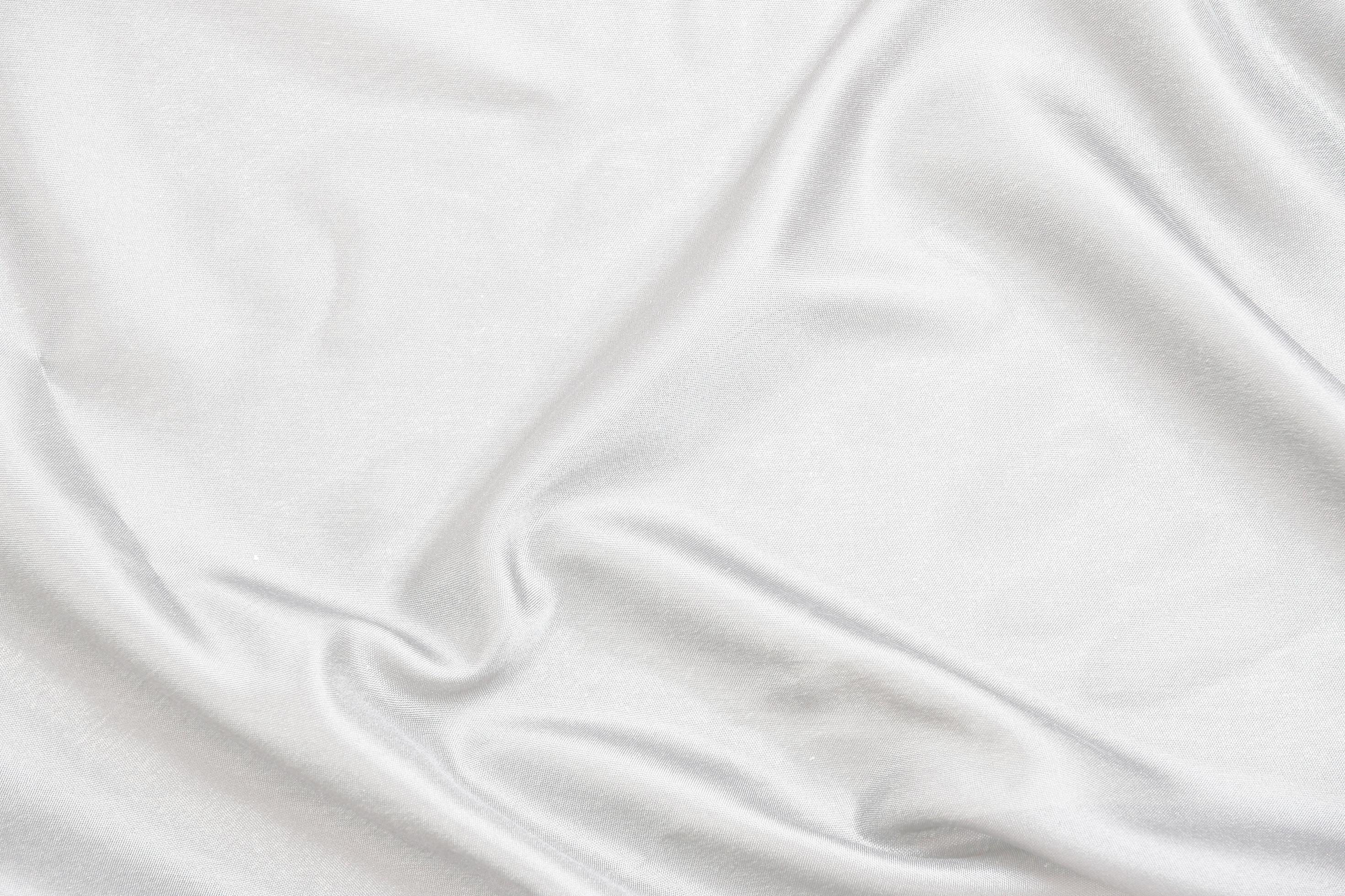 Smooth elegant white silk fabric or satin luxury cloth texture for ...