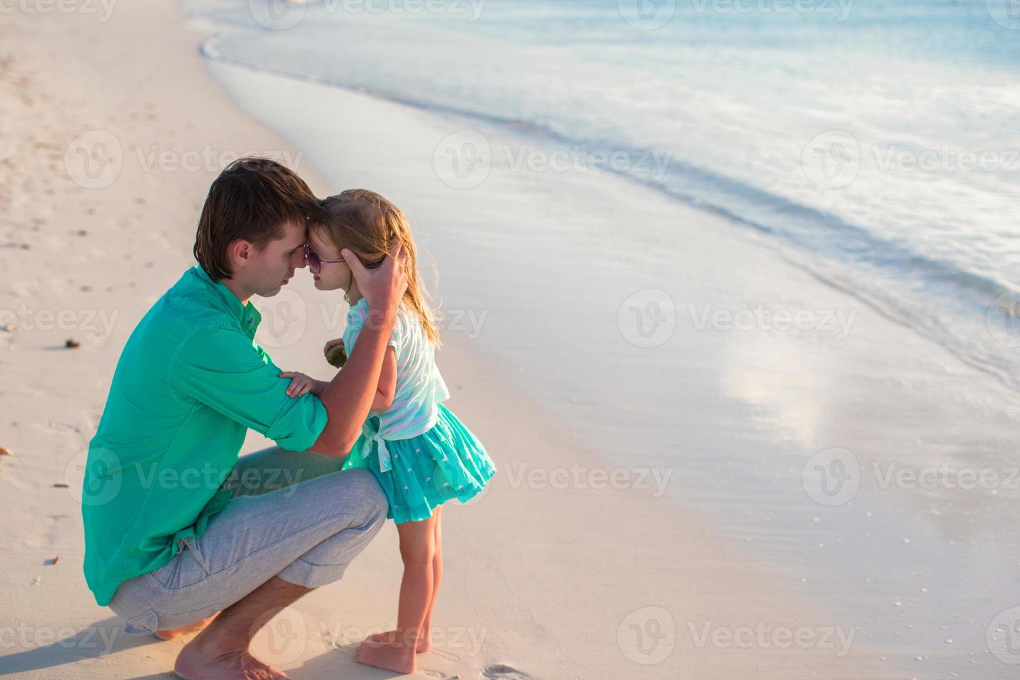 Happy father and his cute little daughter at beach 17706513 Stock Photo at Vecteezy