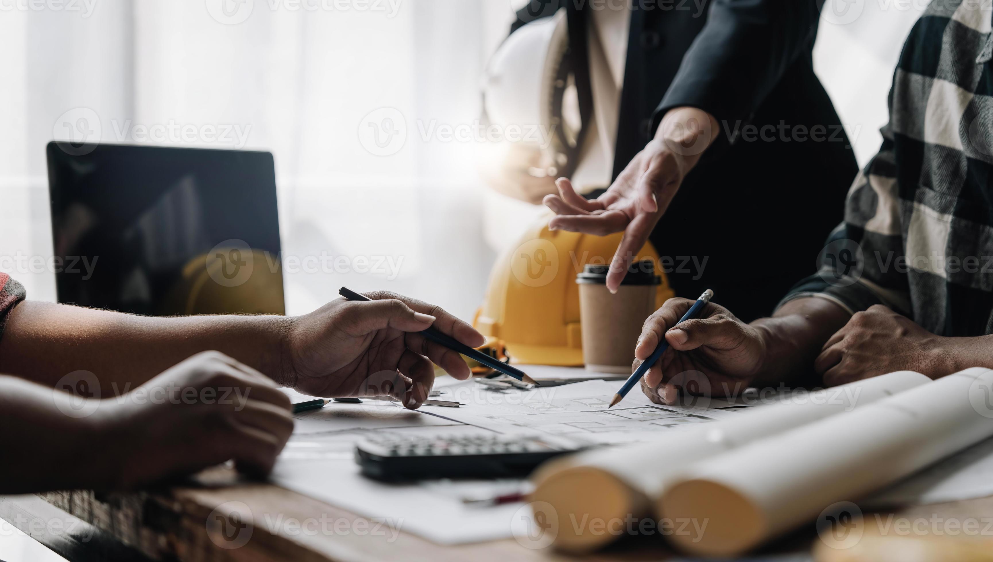 Engineer Teamwork Meeting, Drawing working on blueprint meeting for project working with partner ...
