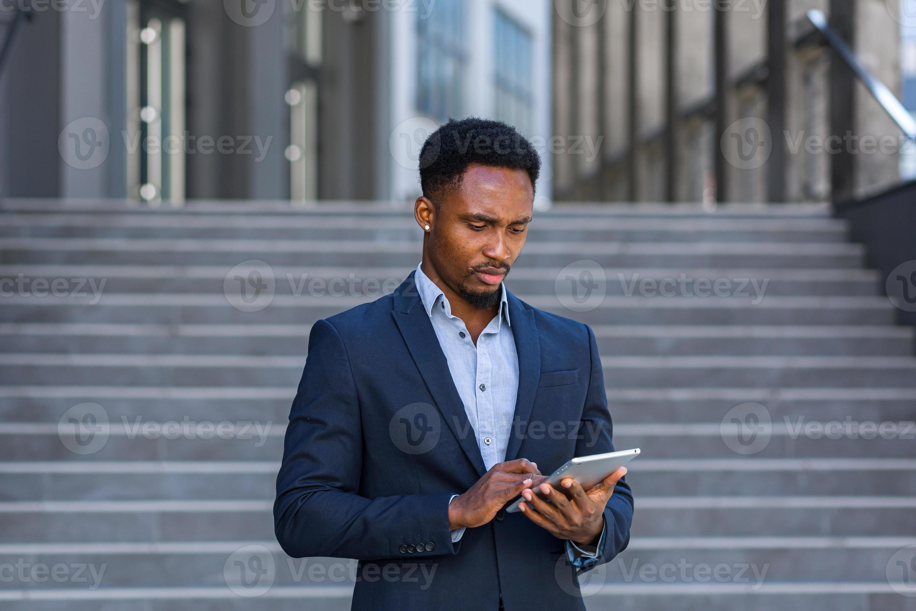 Young african american businessman in formal business suit standing ...
