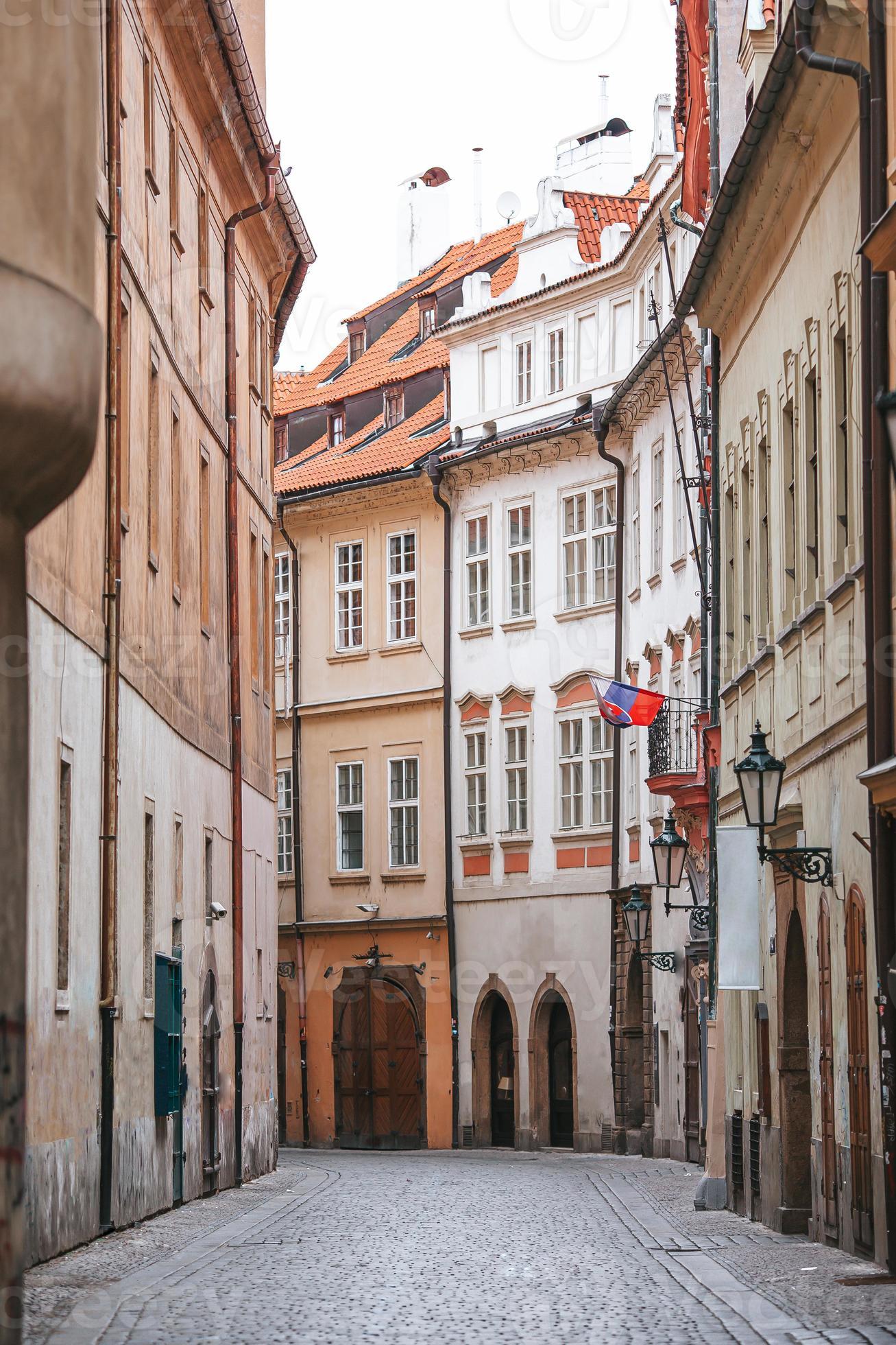Old narrow street in Europe. District of the city of Prague, Czech Republic, and one of its most ...