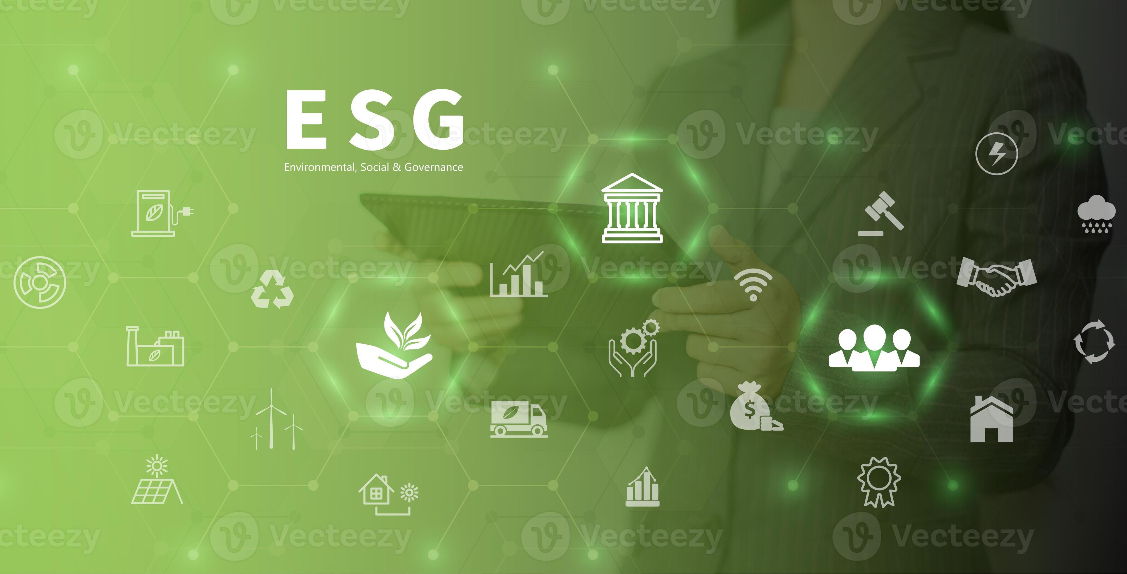 ESG environment social governance investment business concept. Women use a computer to analyze ...