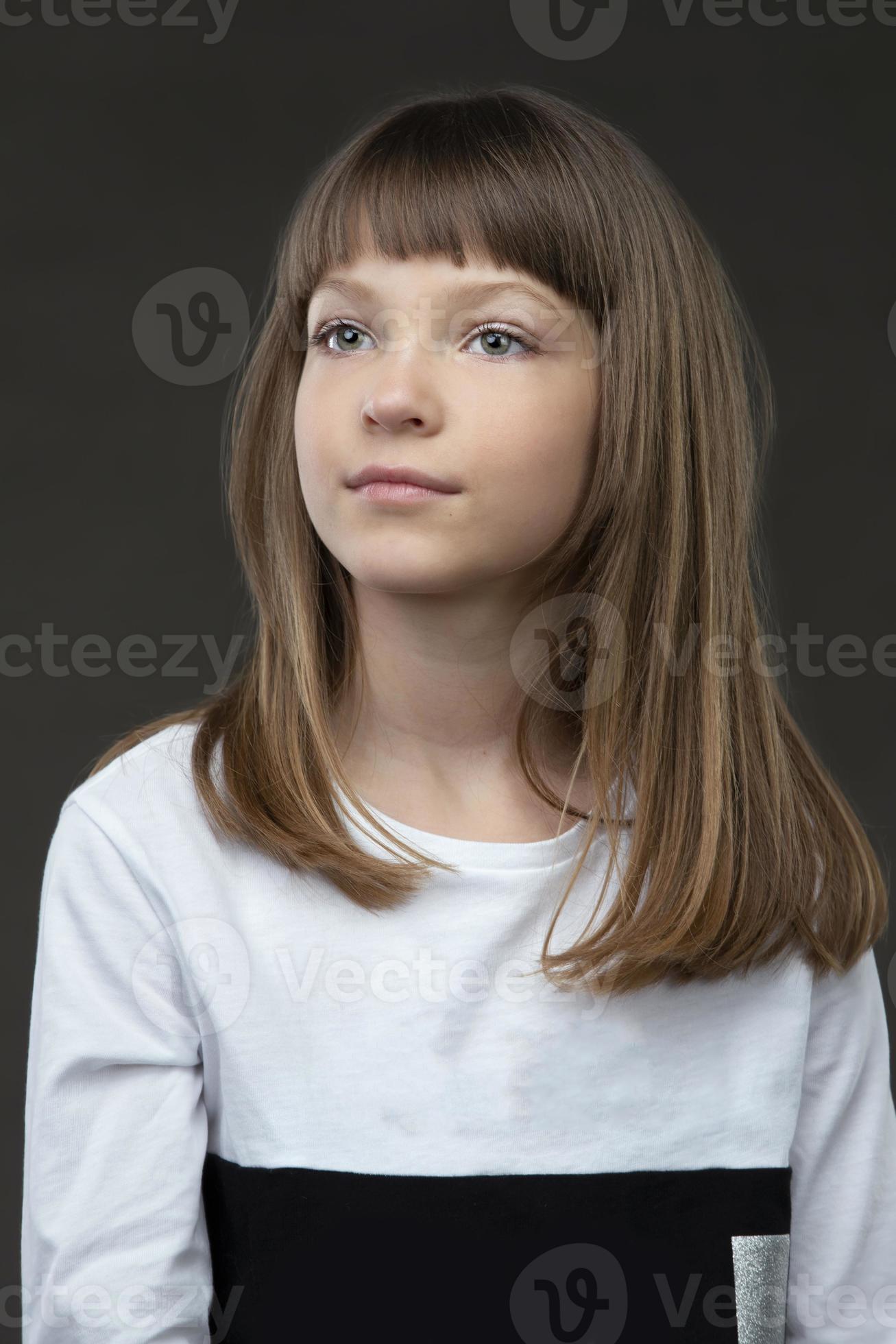 The Face Of A Ten Year Old Girl Who Is Not Looking At The Camera